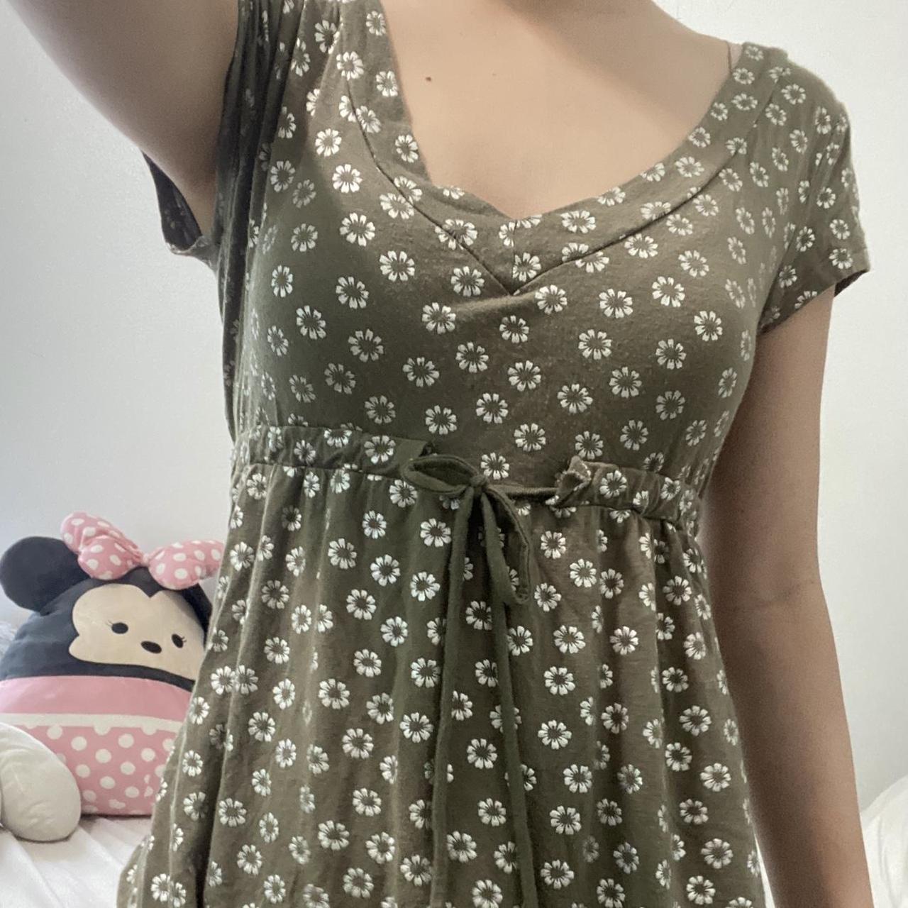 cute floral green blouse with strings to make you... - Depop