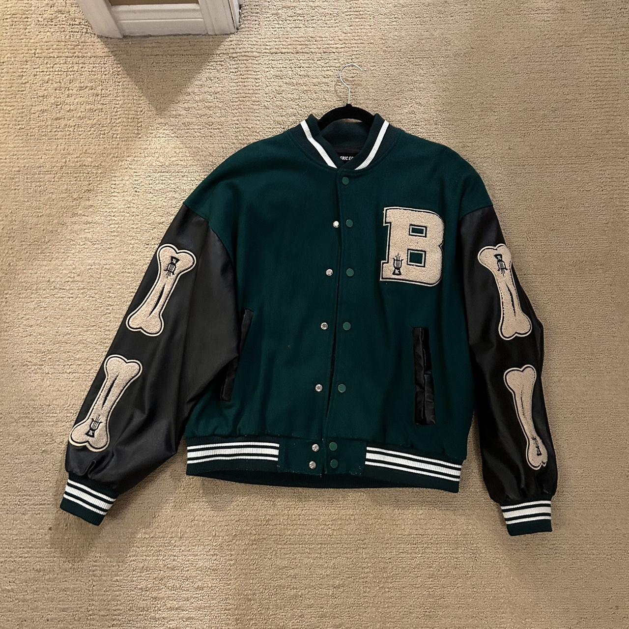 Green and black varsity jacket fits like a large or... - Depop