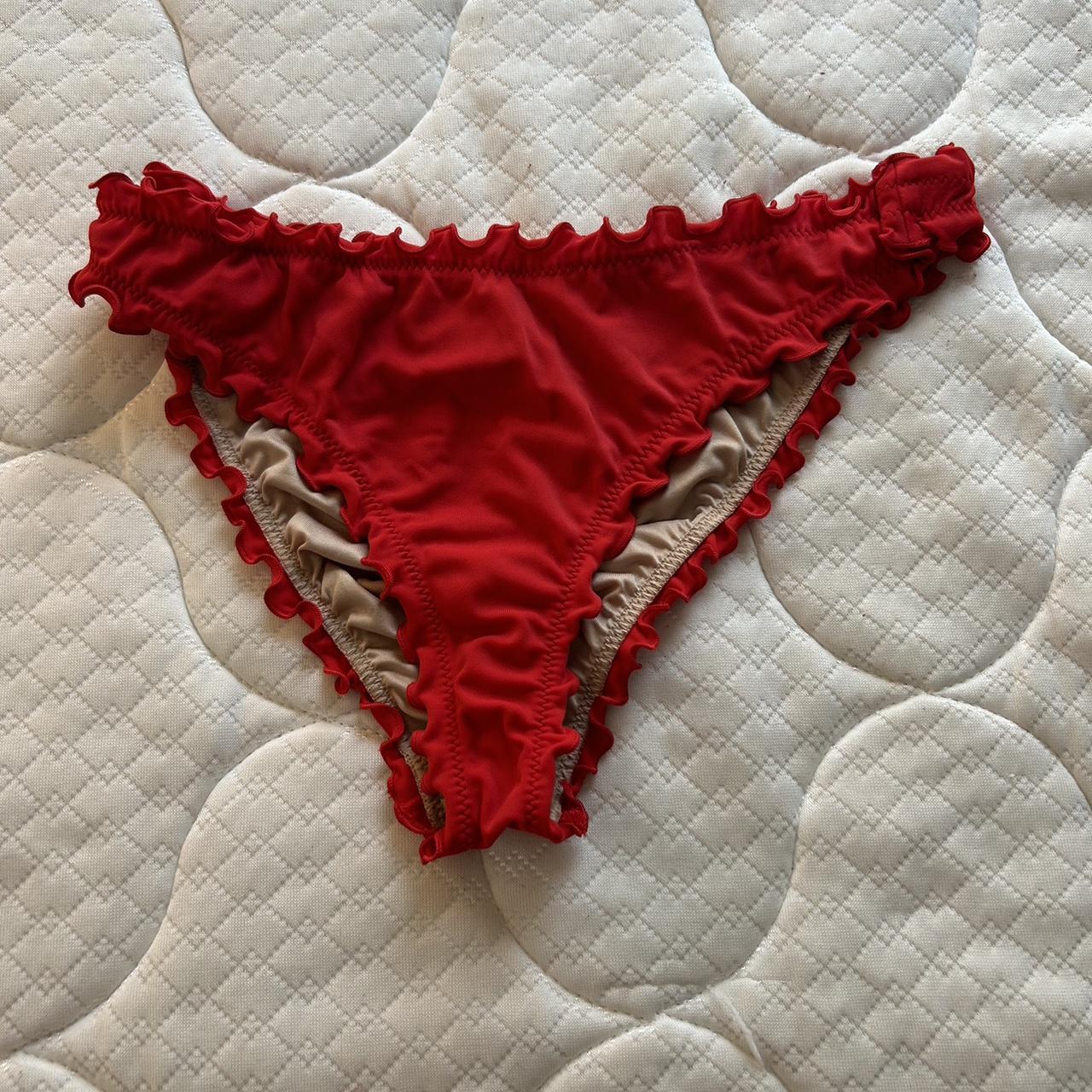 Red bikini top with fringe and red ruffle bottoms.... - Depop