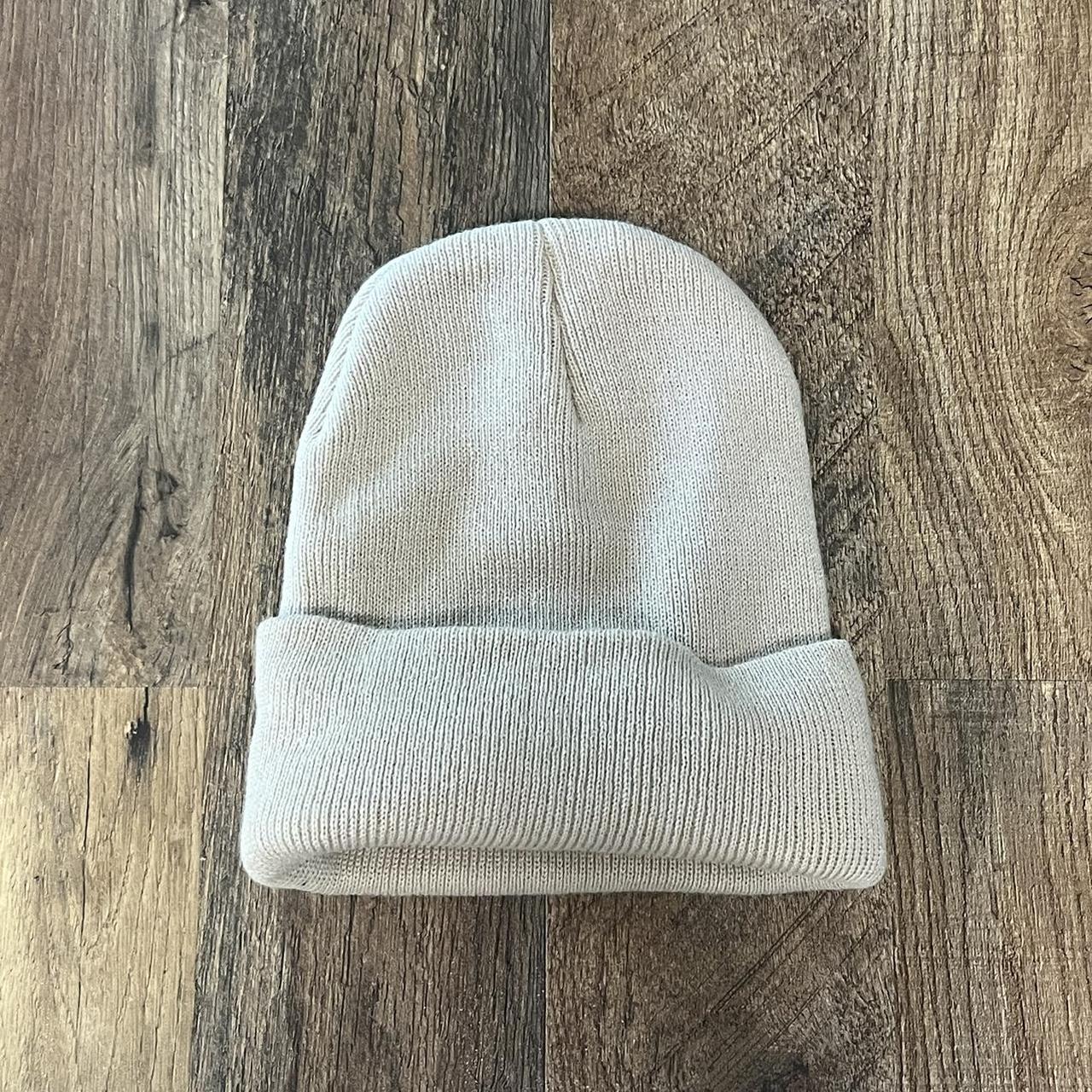 Beige beanie, fits sorta small - Depop