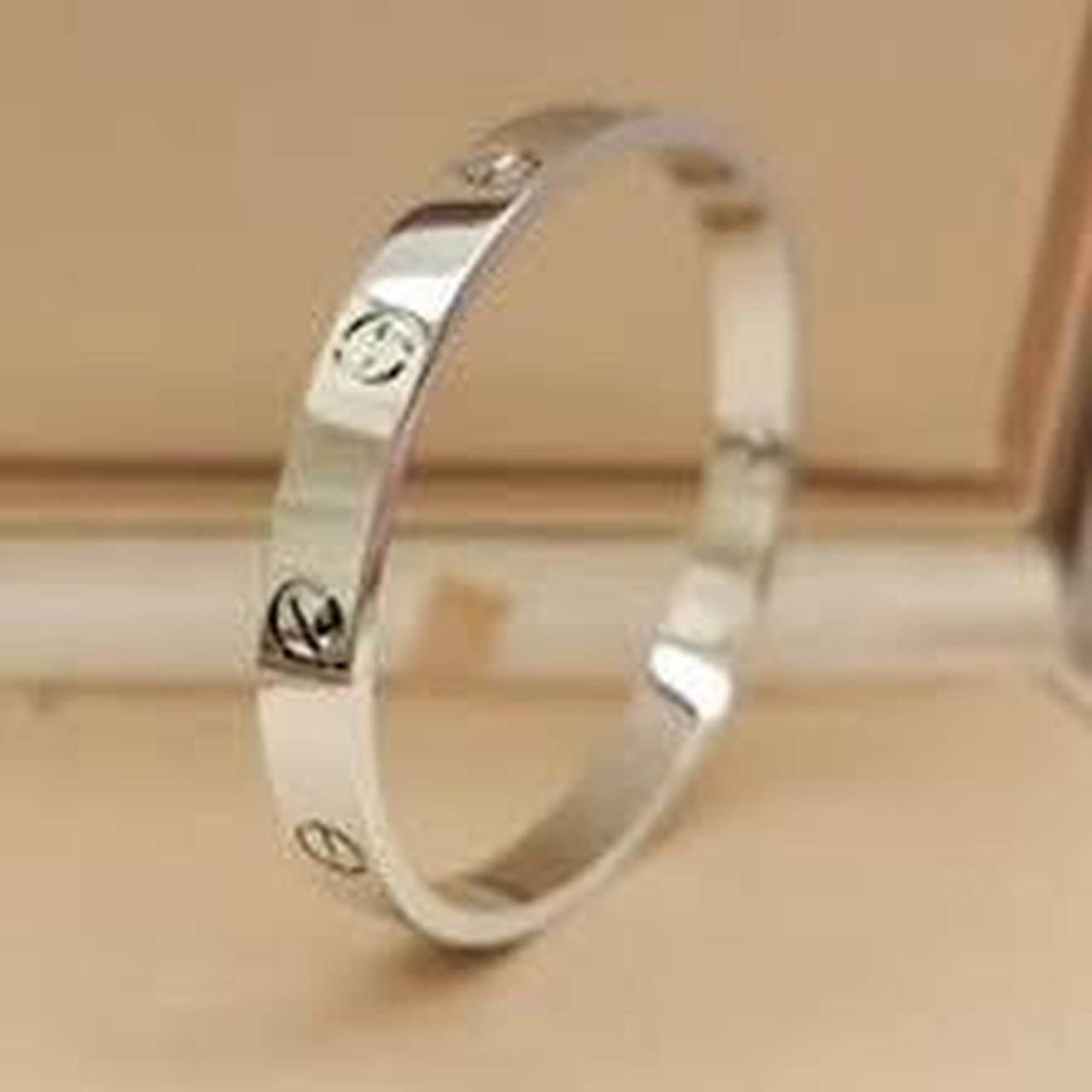 Cartier love bracelet (silver) perfect condition... - Depop