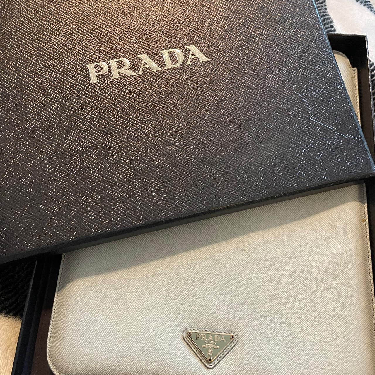 Prada iPad case dented and damaged at top - Depop