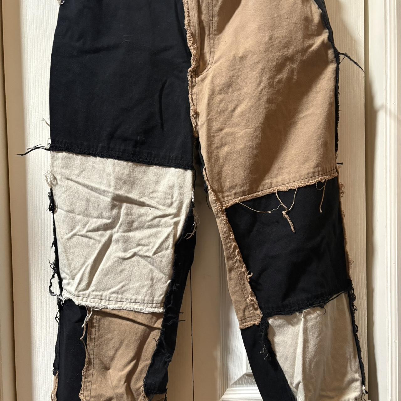 Unique patchwork denim jeans in black and tan... - Depop