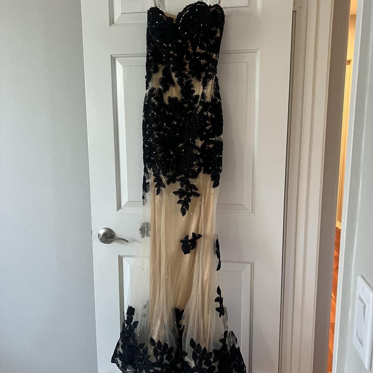 Strapless tan ball gown with black rose details and... - Depop