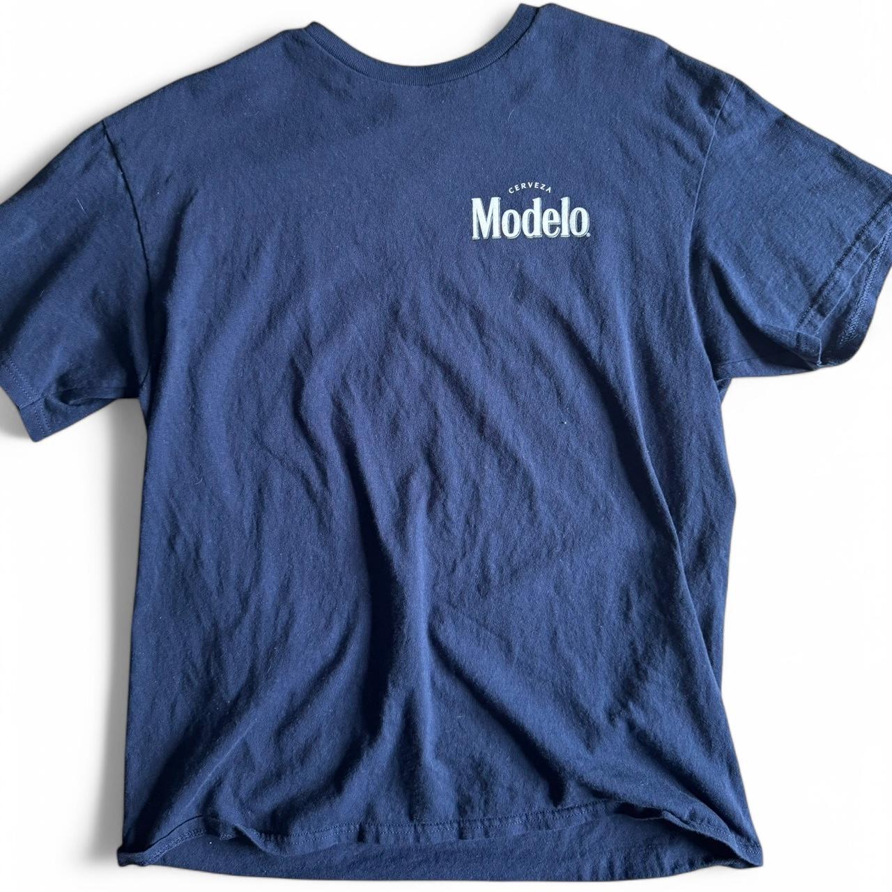 Navy blue vintage Modelo shirt (Does not have tag... | Depop