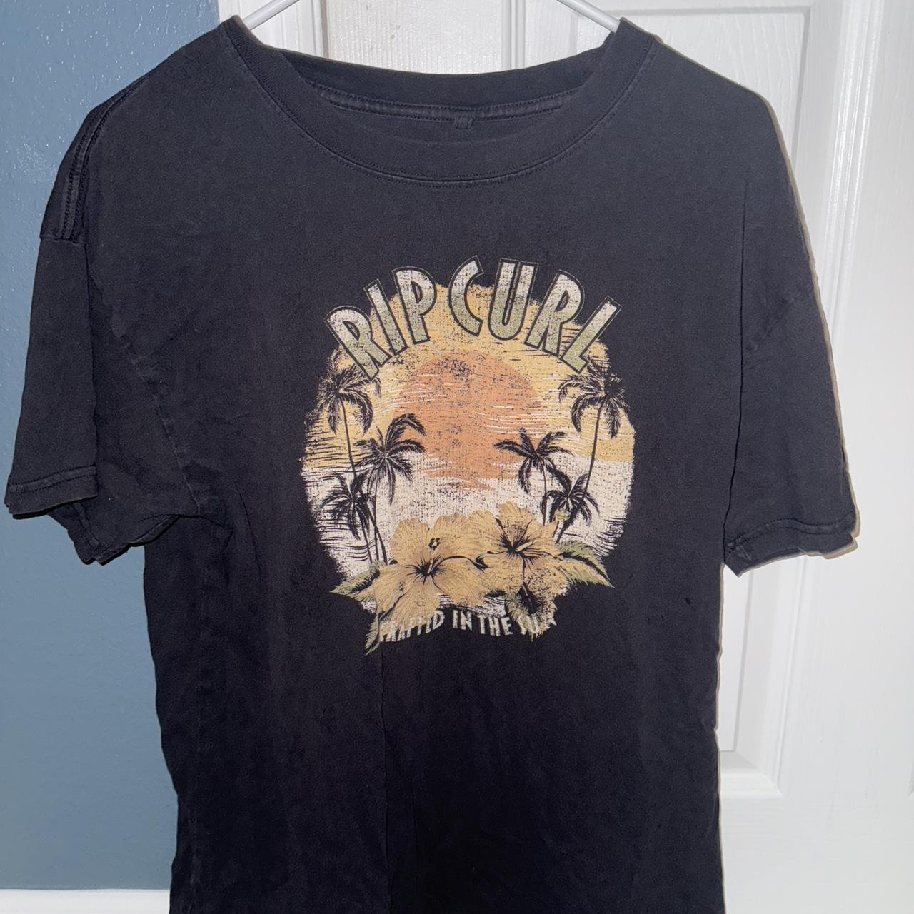 Black Rip Curl graphic tee with a beachy vibe,... | Depop