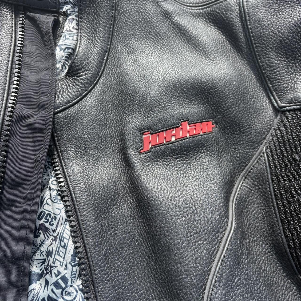 Black leather Jordan biker jacket with red accents... | Depop