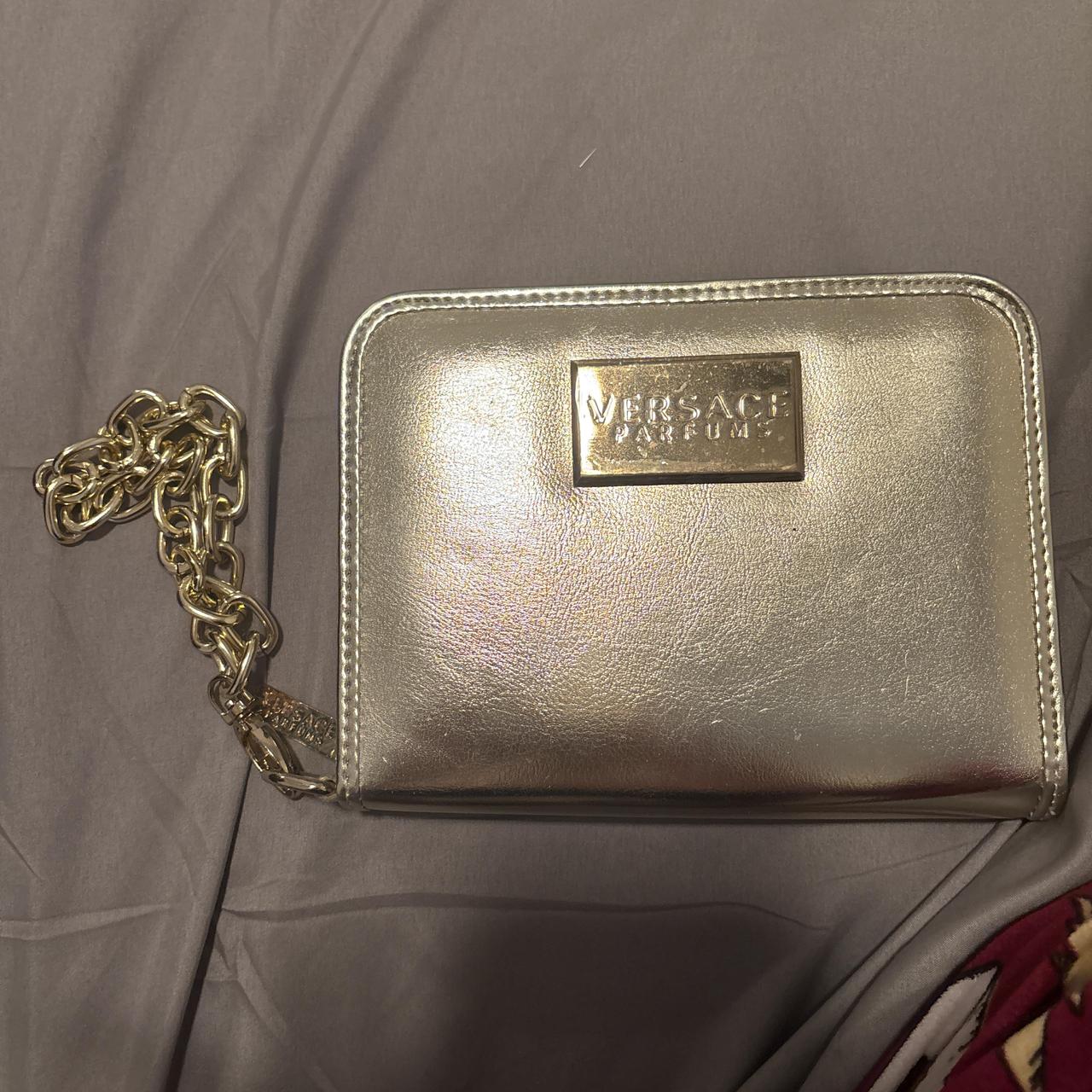 Gold Versace wallet with chain #luxuryaccessories... - Depop