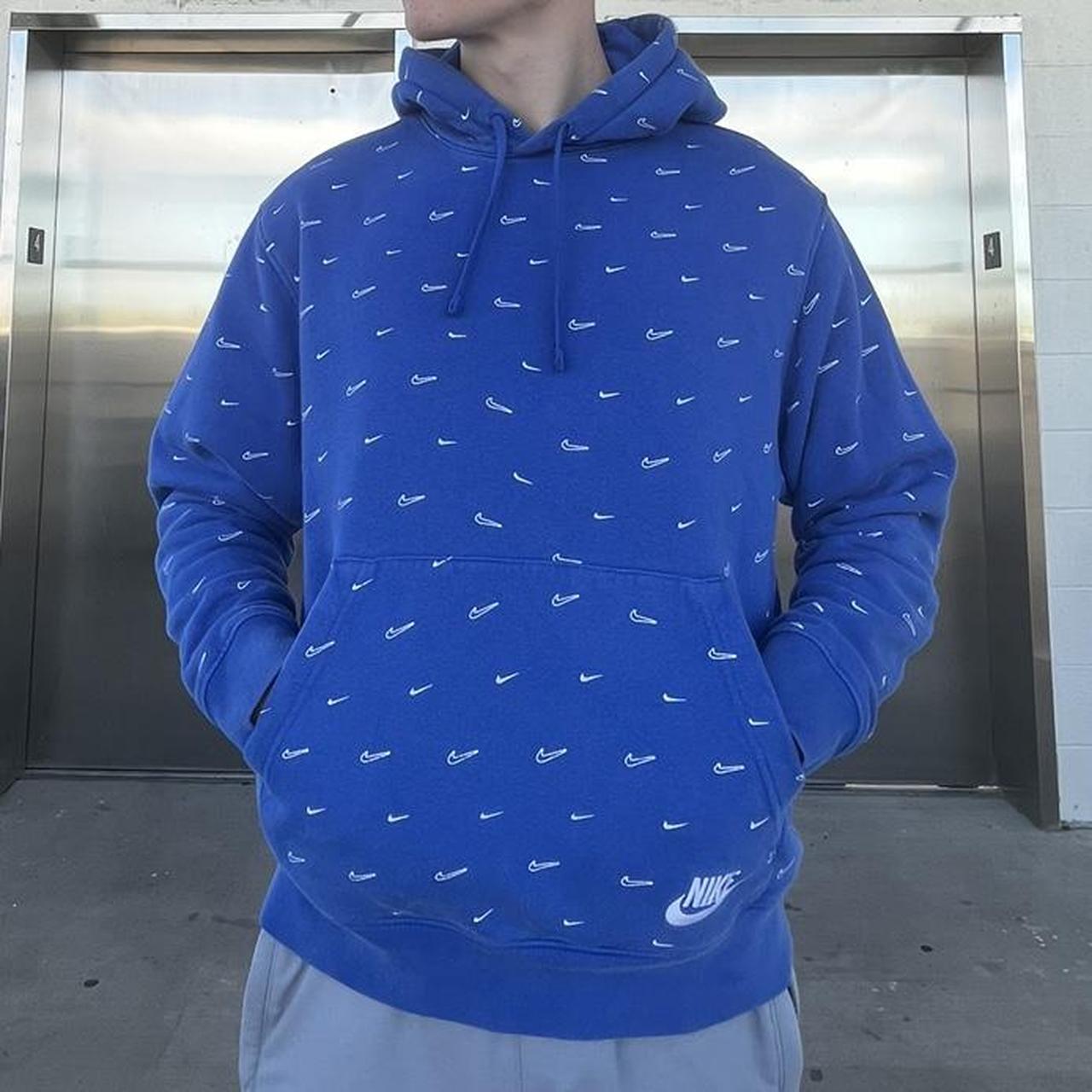 Nike All over Print swoosh hoodie. Size medium,... - Depop