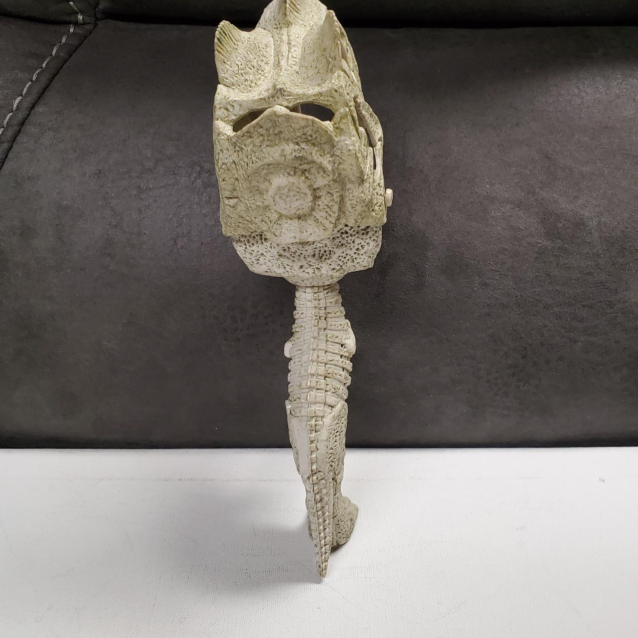 The gripping toy is mathed with the dinosaur fossil... - Depop