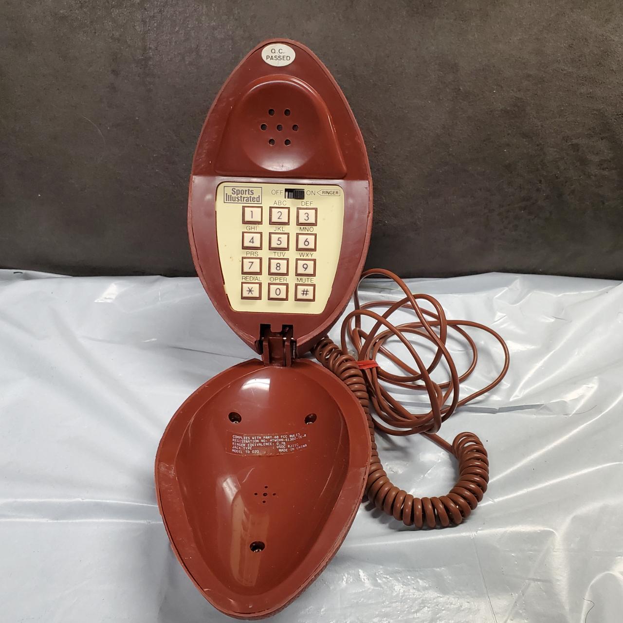 This vintage Sports Illustrated Football Phone from... - Depop