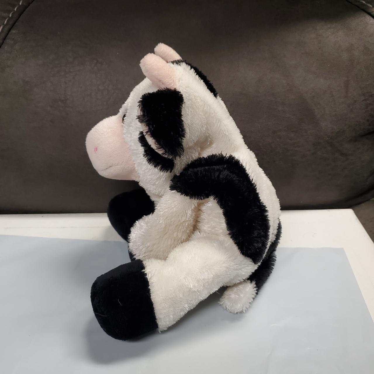 This adorable black and white cow hand puppet... - Depop