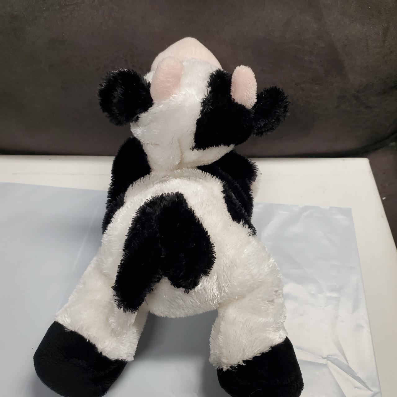 This adorable black and white cow hand puppet... - Depop