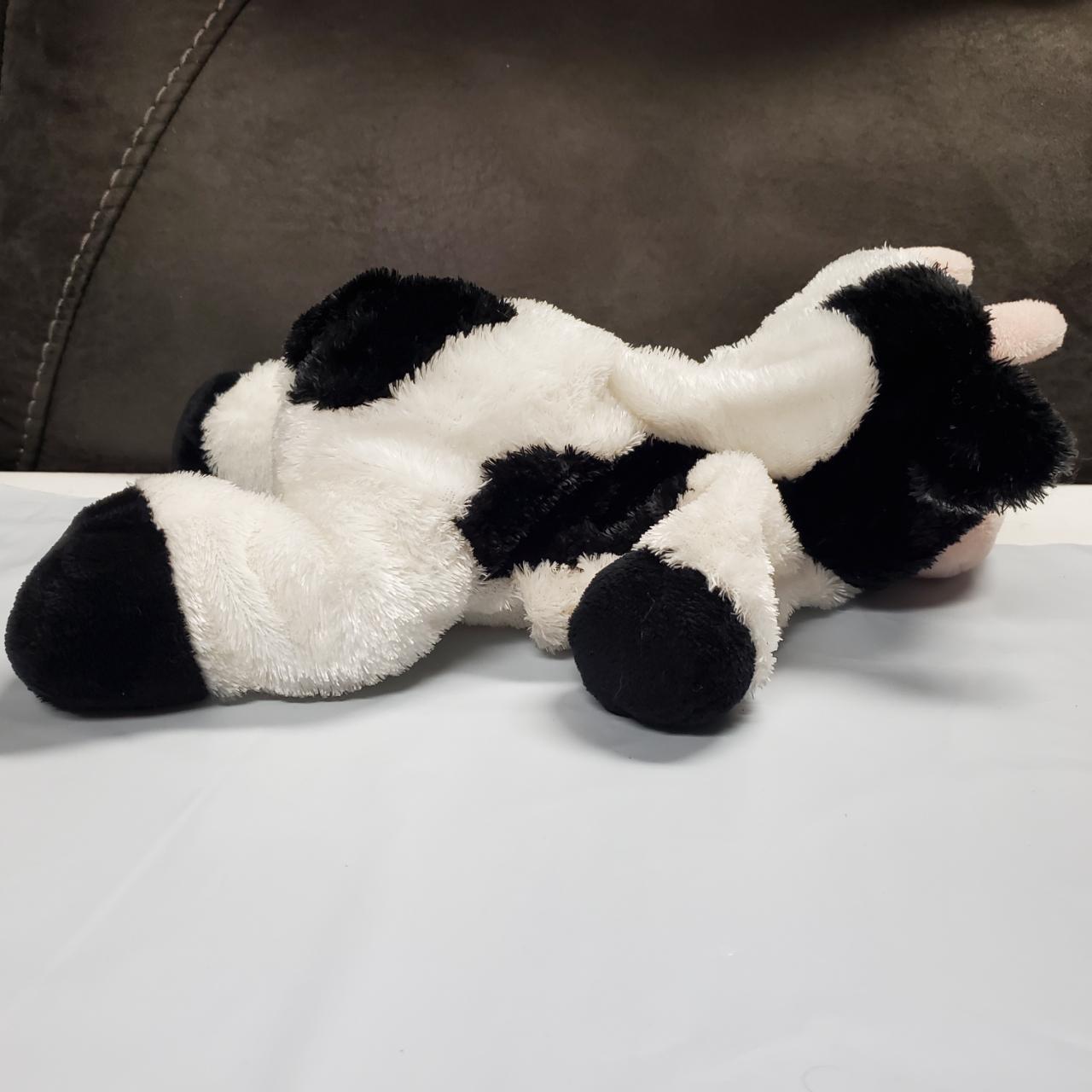 This adorable black and white cow hand puppet... - Depop