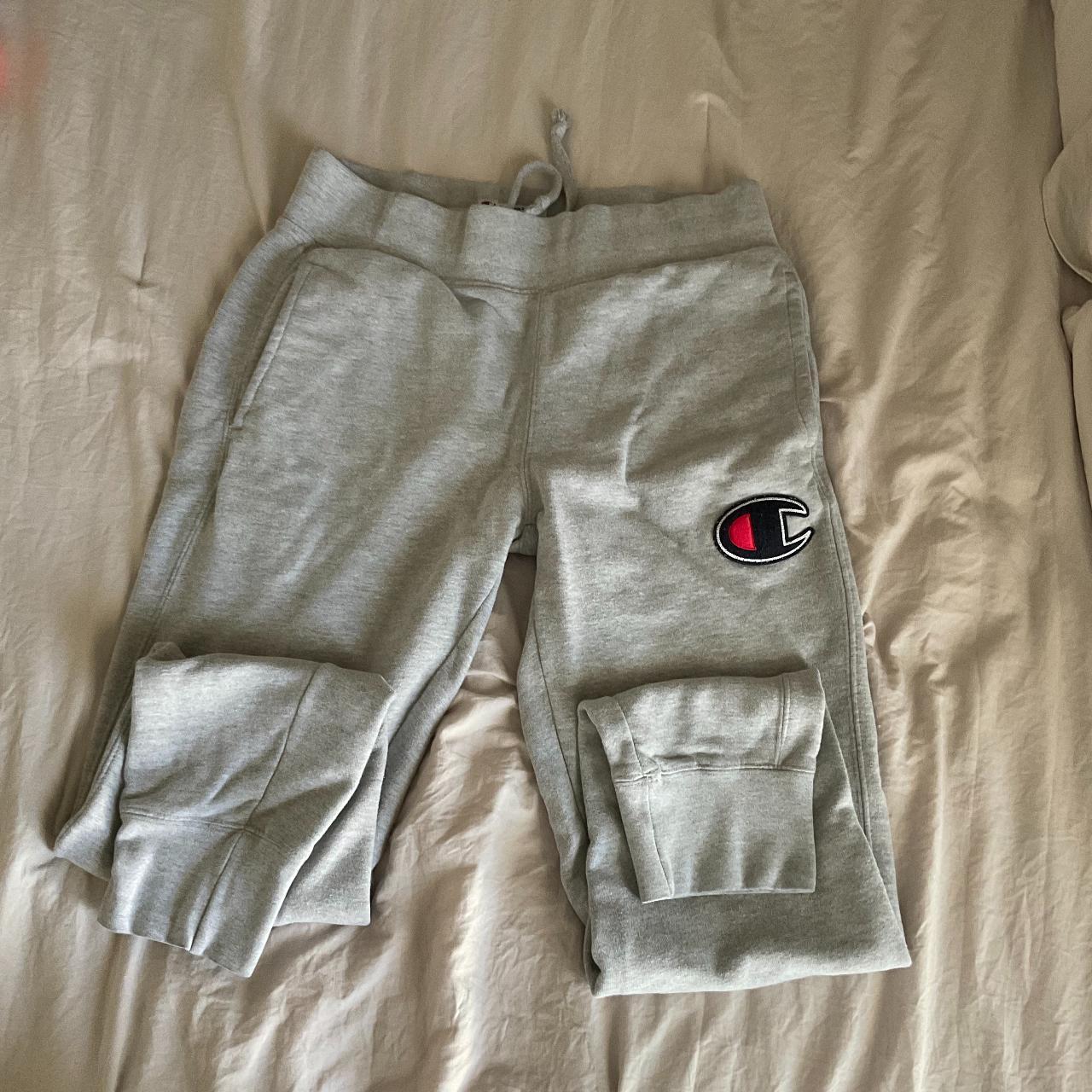 grey Champion sweats with logo and pockets on front... - Depop