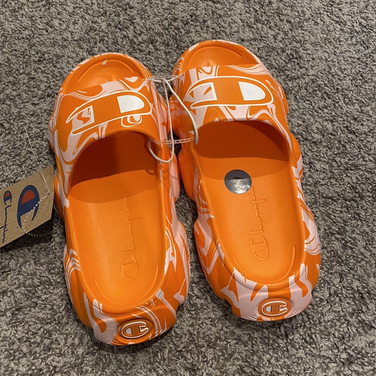 Orange champion slides - Depop