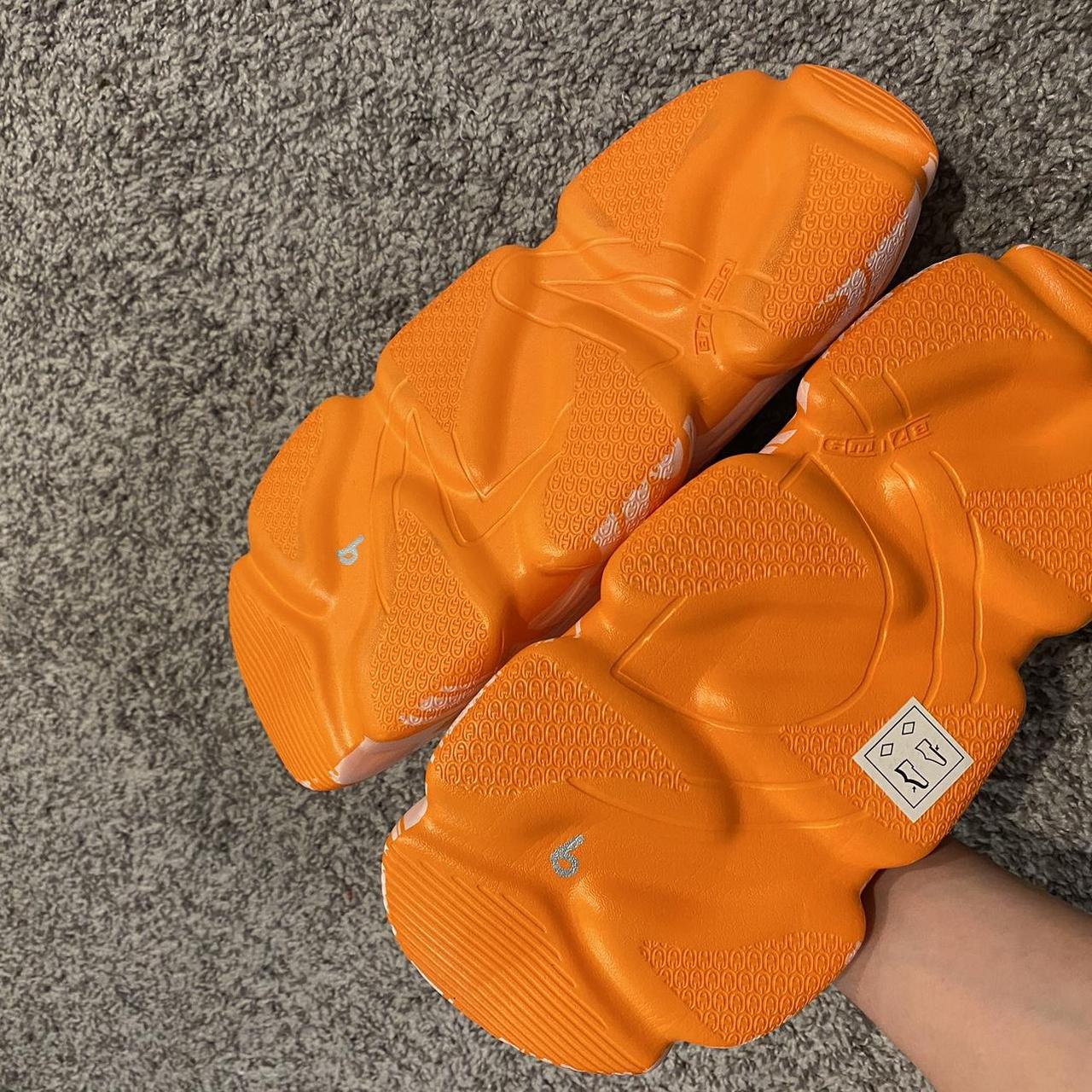Orange champion slides - Depop
