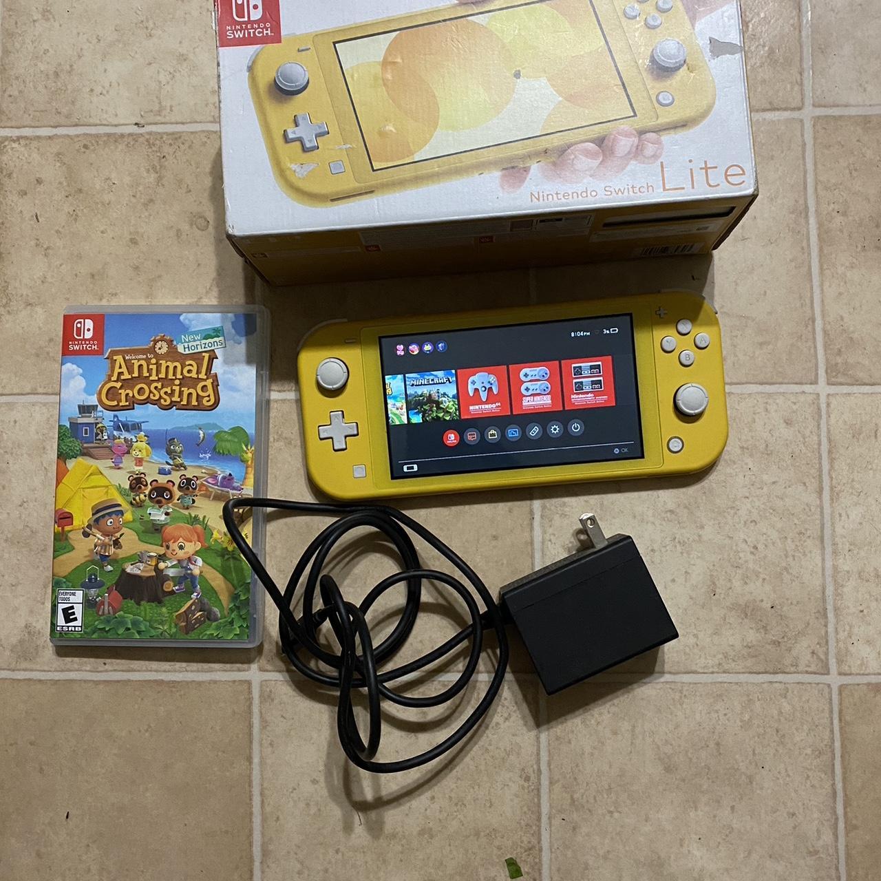 yellow nintendo switch lite comes with animal... - Depop