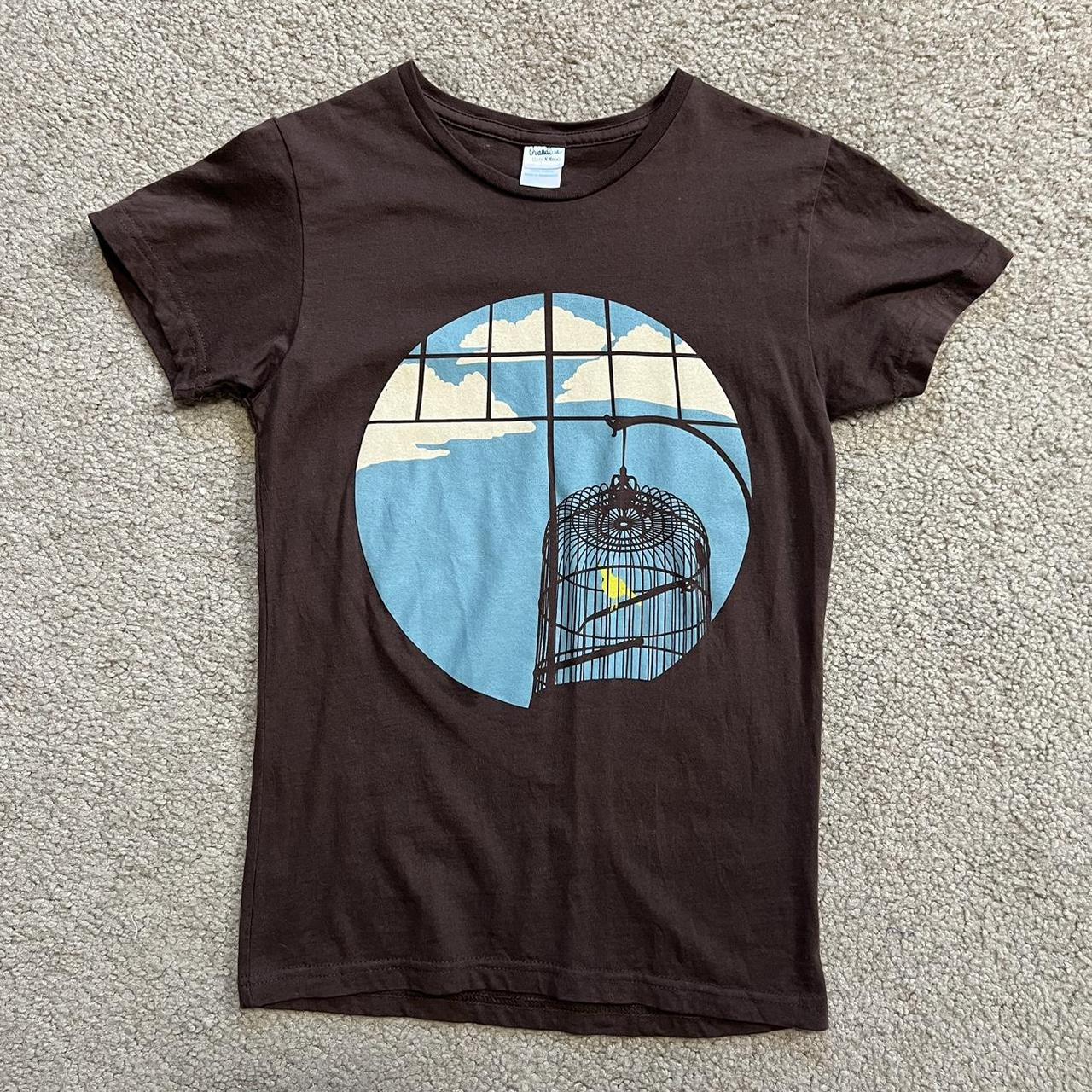 caged bird graphic tee from threadless size xs... - Depop