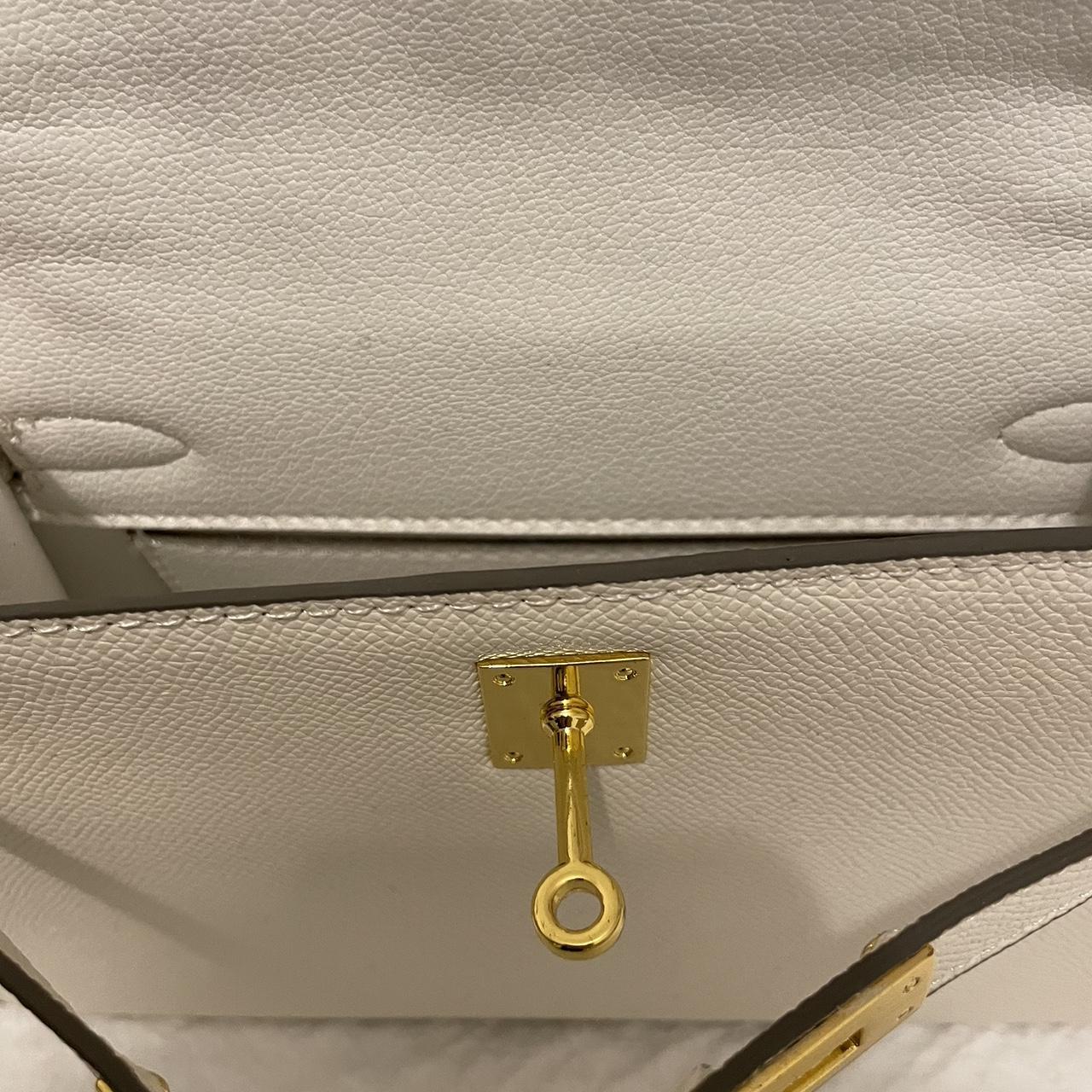Mini Kelly look alike in a creamy colour with gold... - Depop