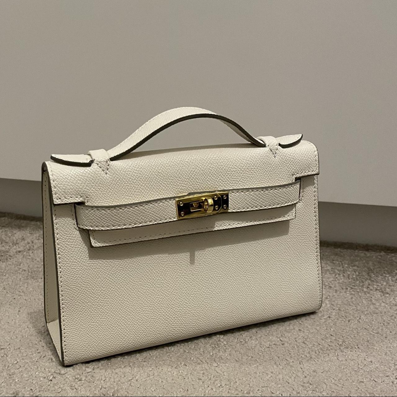 Mini Kelly look alike in a creamy colour with gold... - Depop