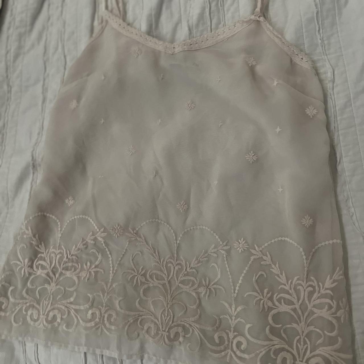 the prettiest sheer cream colored top with flower... - Depop