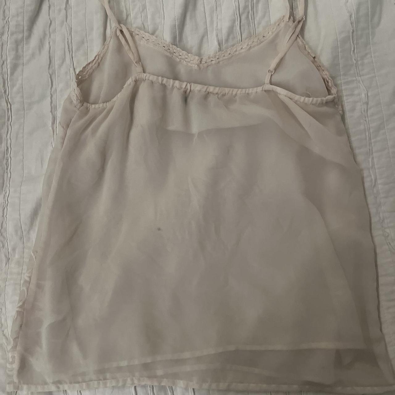 the prettiest sheer cream colored top with flower... - Depop