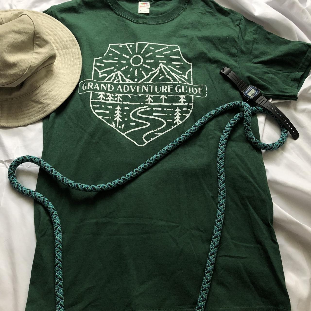 Grand Adventure Guide Unisex Green Graphic T-shirt... - Depop