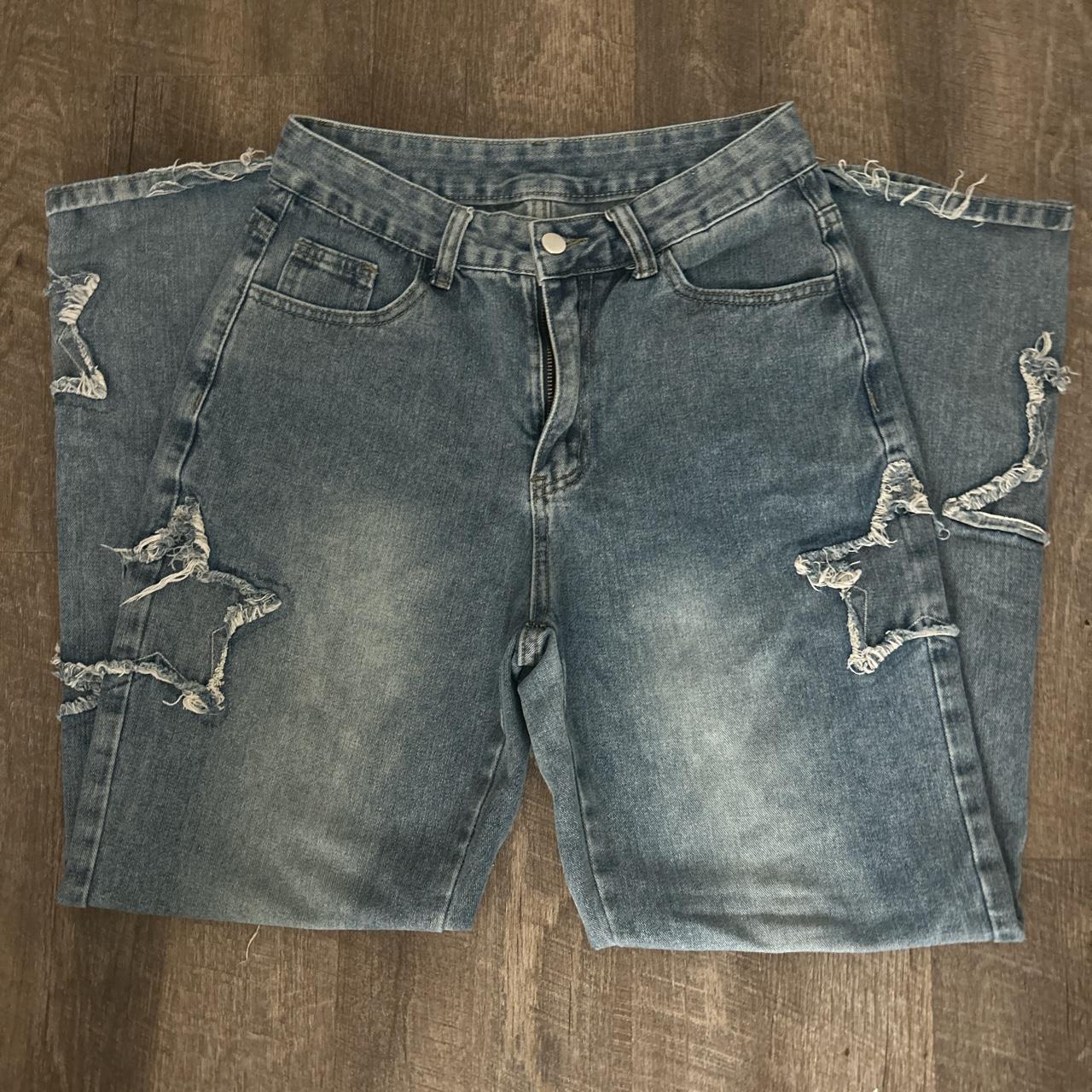 super cute star jeans ripped a tiny bit at the... - Depop