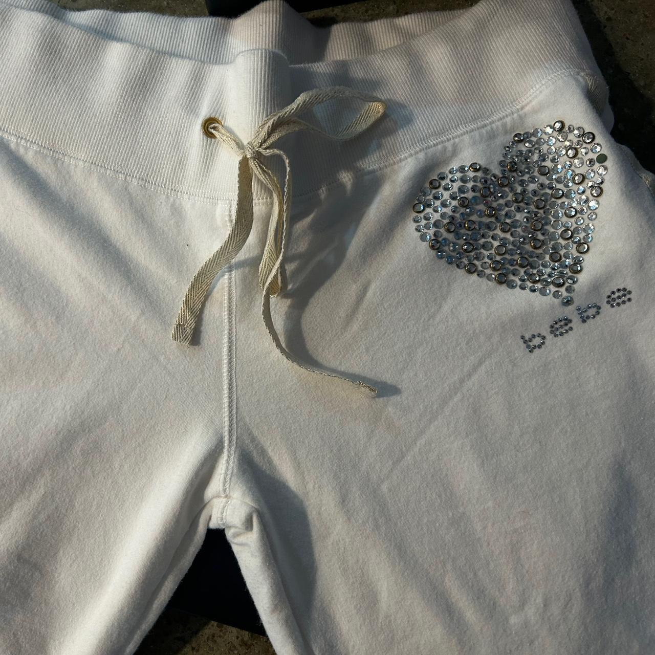 White Bebe capris with rhinestone heart and... | Depop