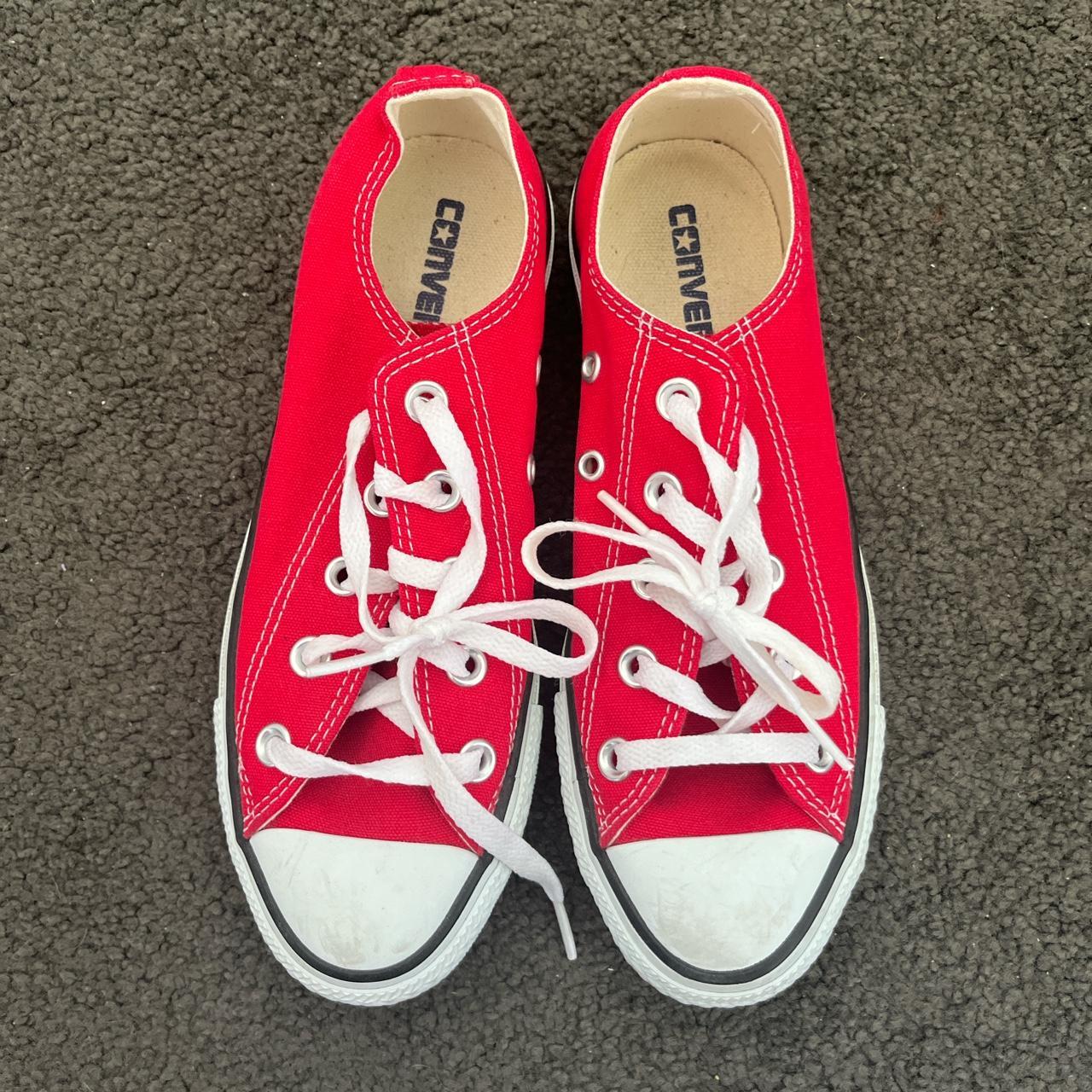Red converse low top sneakers Only worn a handful of... - Depop