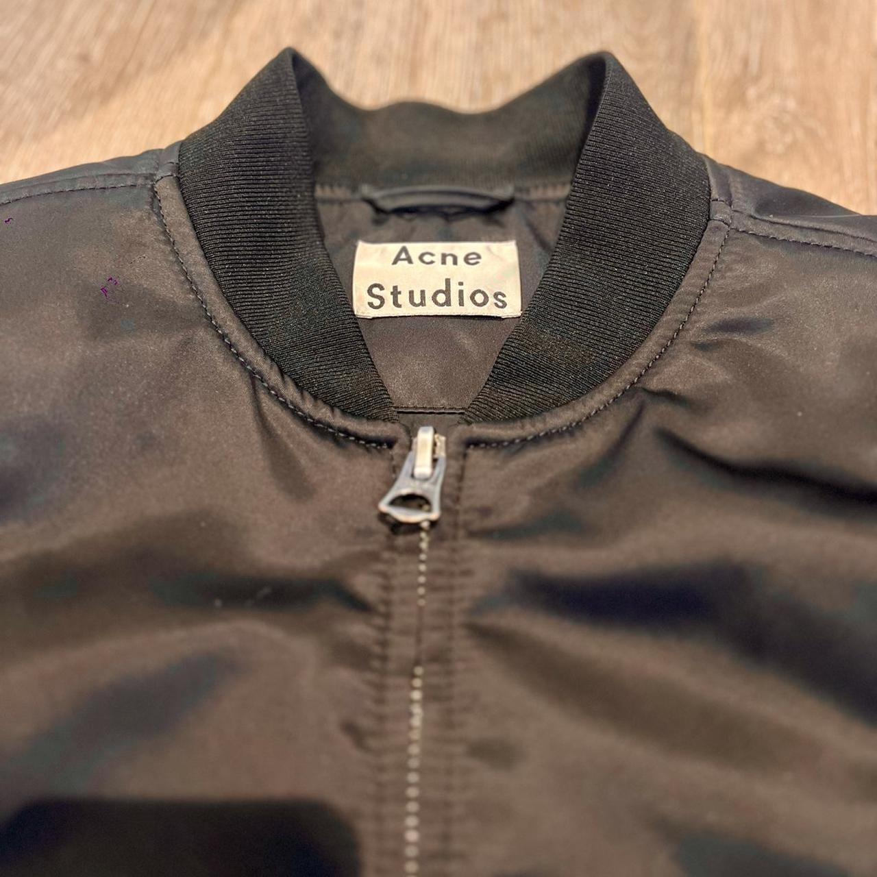 Acne Studios black bomber jacket. Nylon shell padded... - Depop
