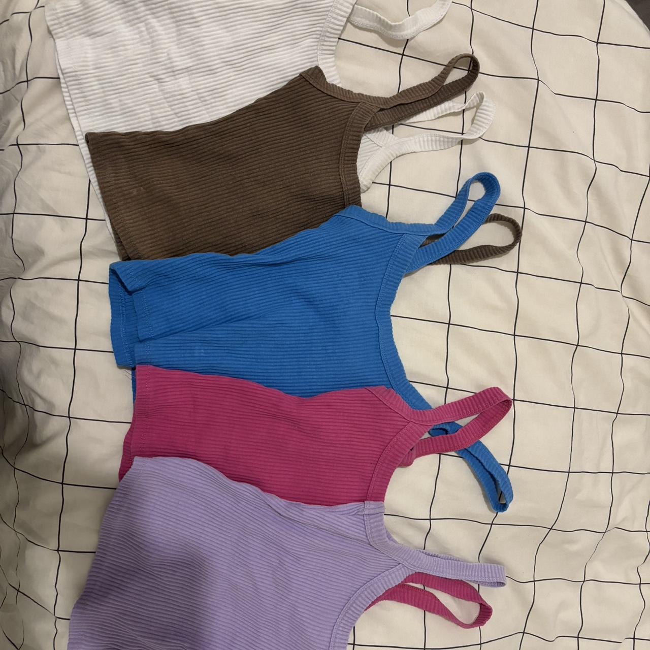 white,blue,purple,pink and brown riri tanks all size... - Depop