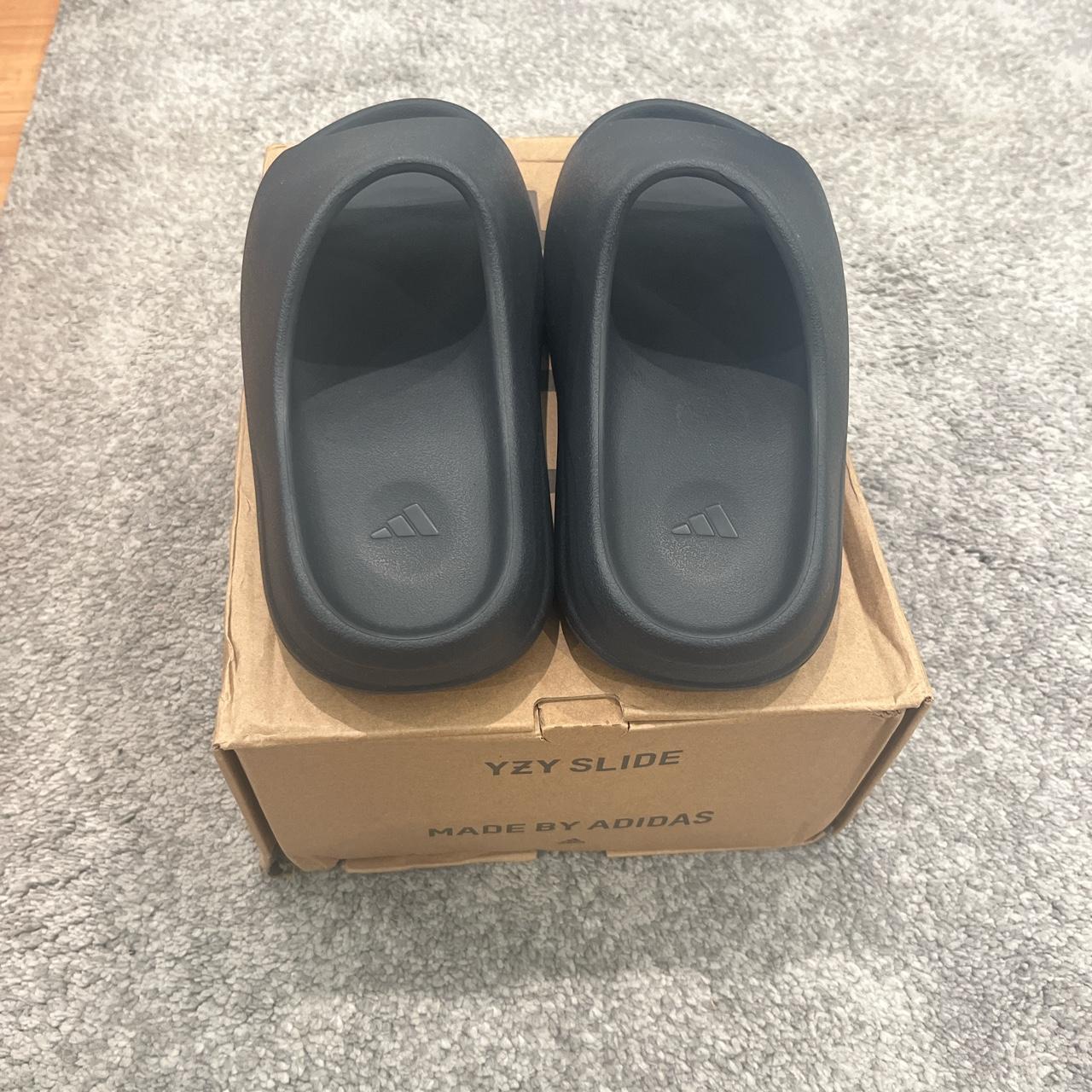 Yeezy Slide Onyx Size 9 Fits like size 8 Box bottom... - Depop