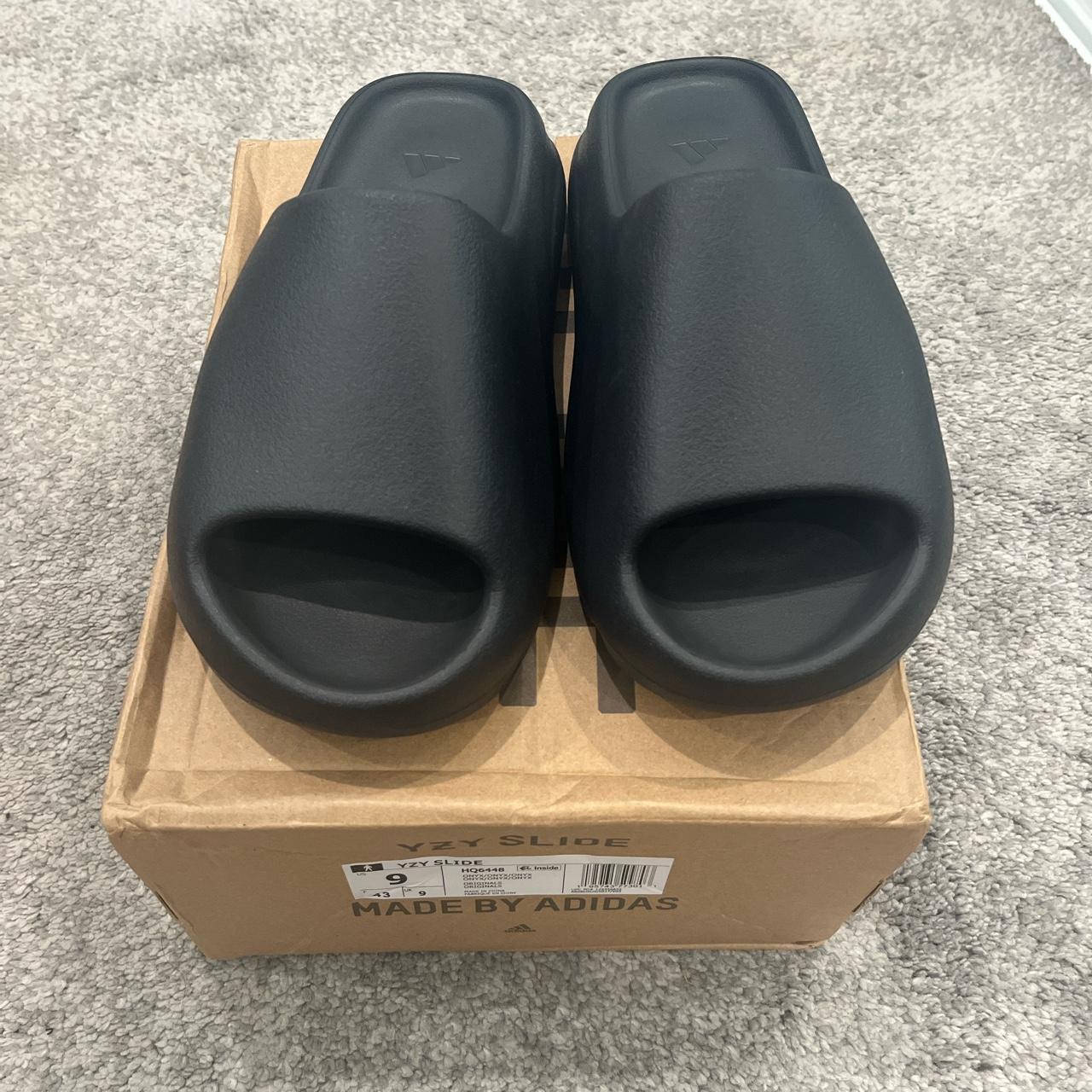 Yeezy Slide Onyx Size 9 Fits like size 8 Box bottom... - Depop
