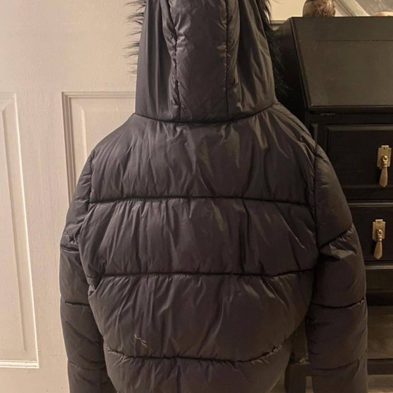 Black puffer jacket lightly worn with a small mud... - Depop