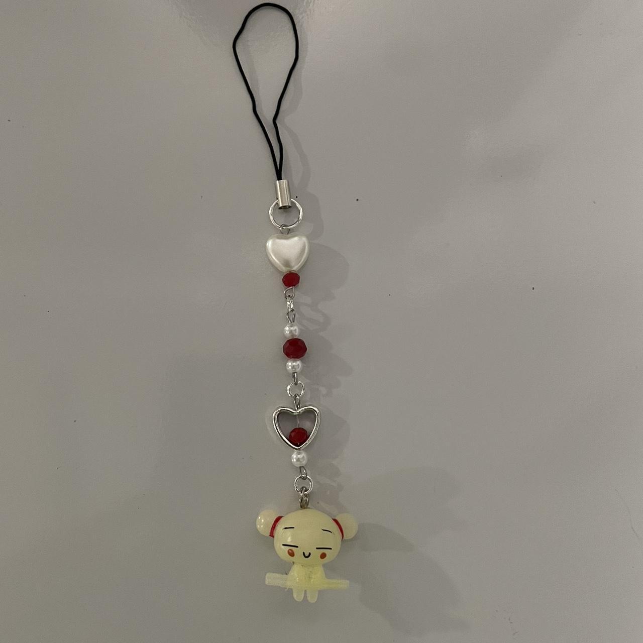 glow in the dark pucca charm from the 2000’s show “... - Depop