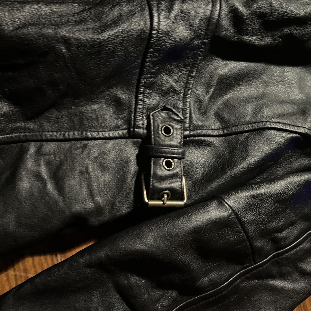 Very heavy leather jacket cool strap thing on the sides - Depop