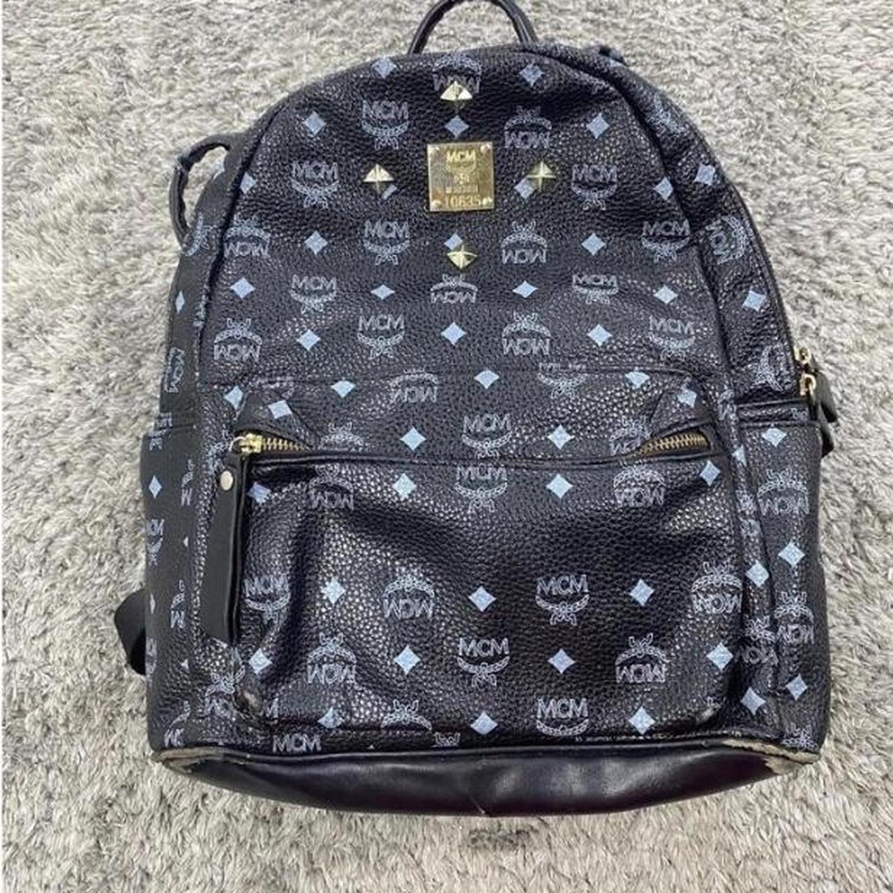 MCM black and blue backpack - Depop