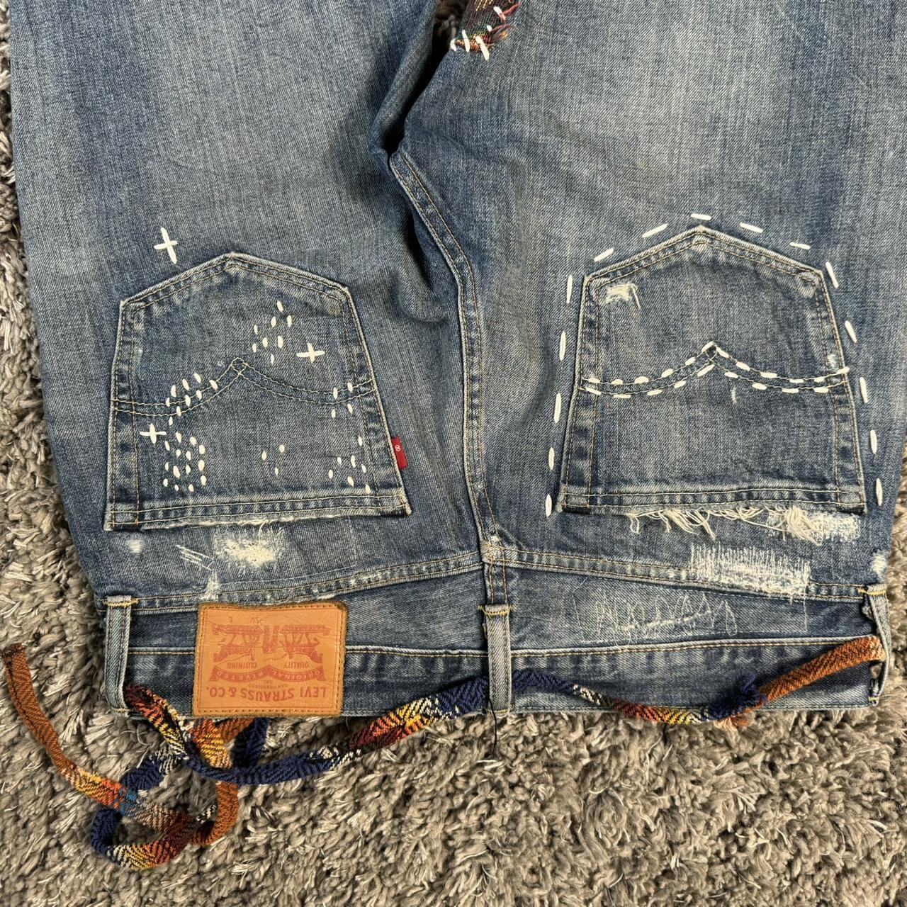 custom Levi's patchwork and sashiko stitched flared... - Depop