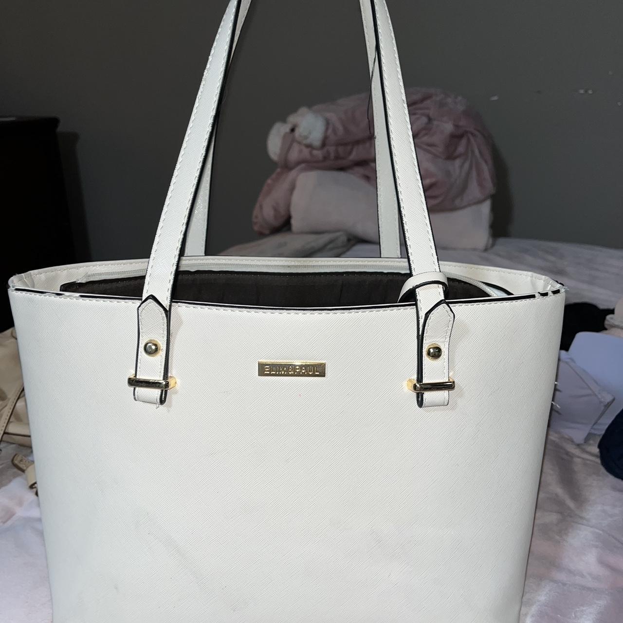 Spacious purse, has inside pockets, it’s a lasting... - Depop