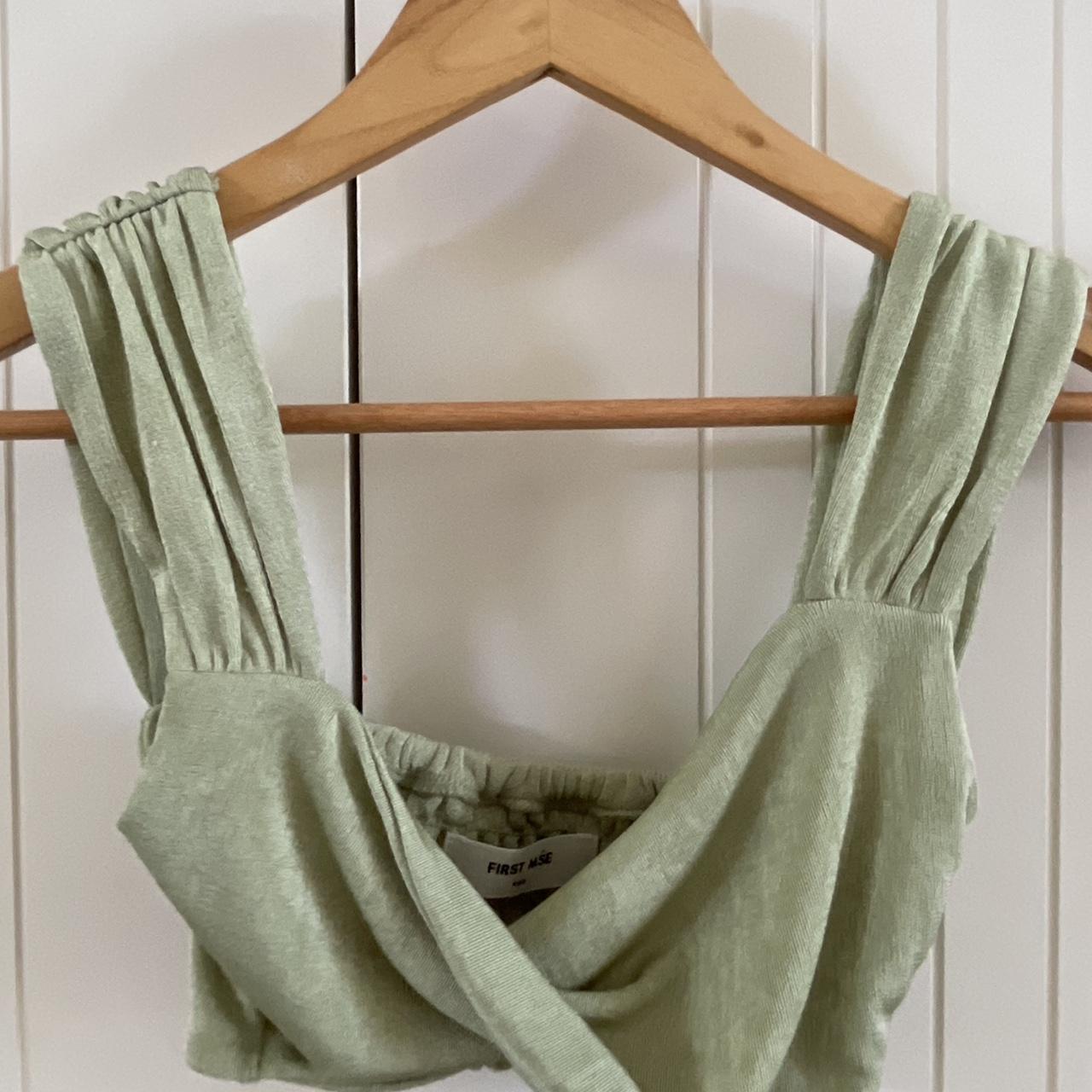 mini top with a cross-over design from the glue... - Depop