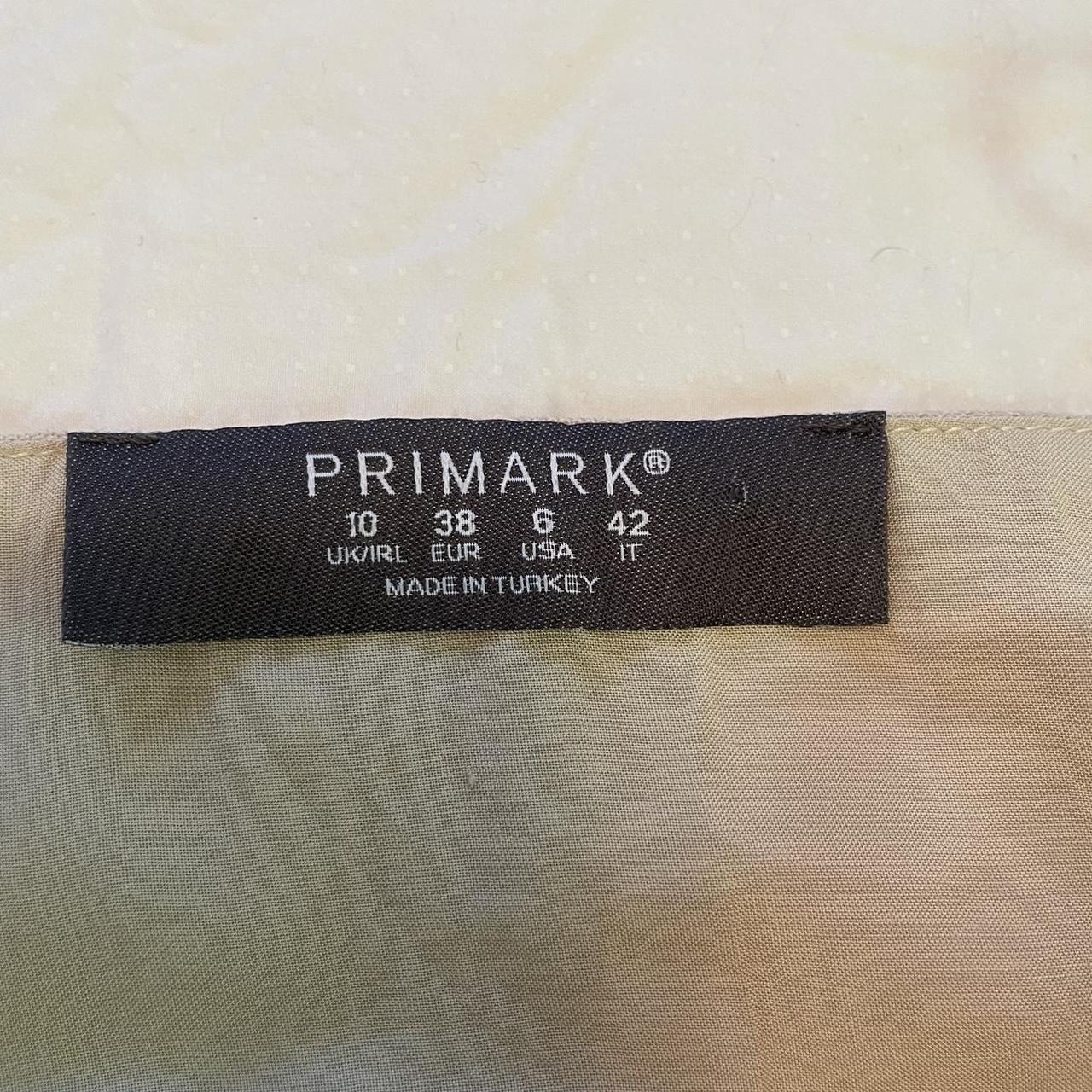 Mini tan linen dress from Primark. Has small cutout... - Depop