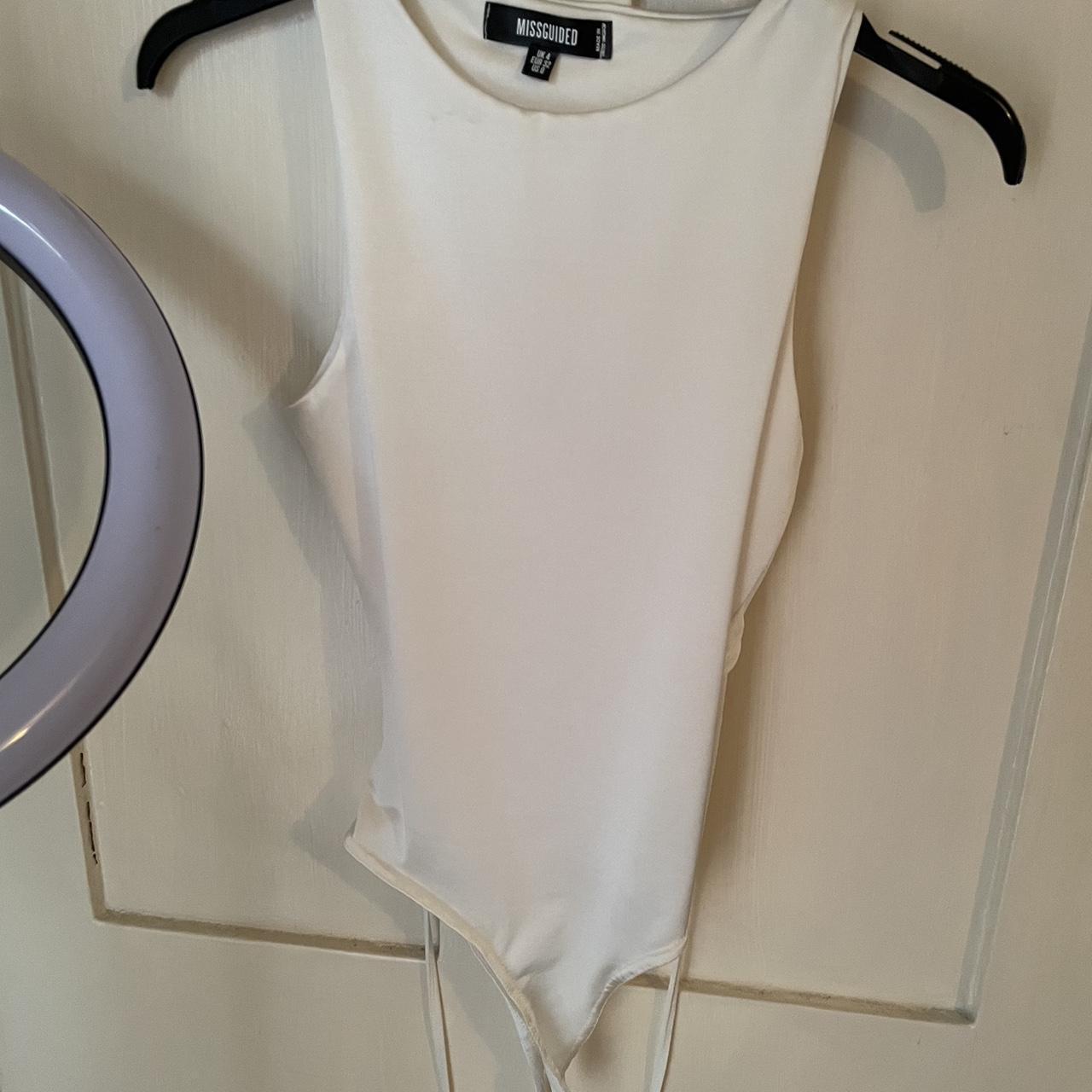 Backless Missguided body suit in white Message... - Depop