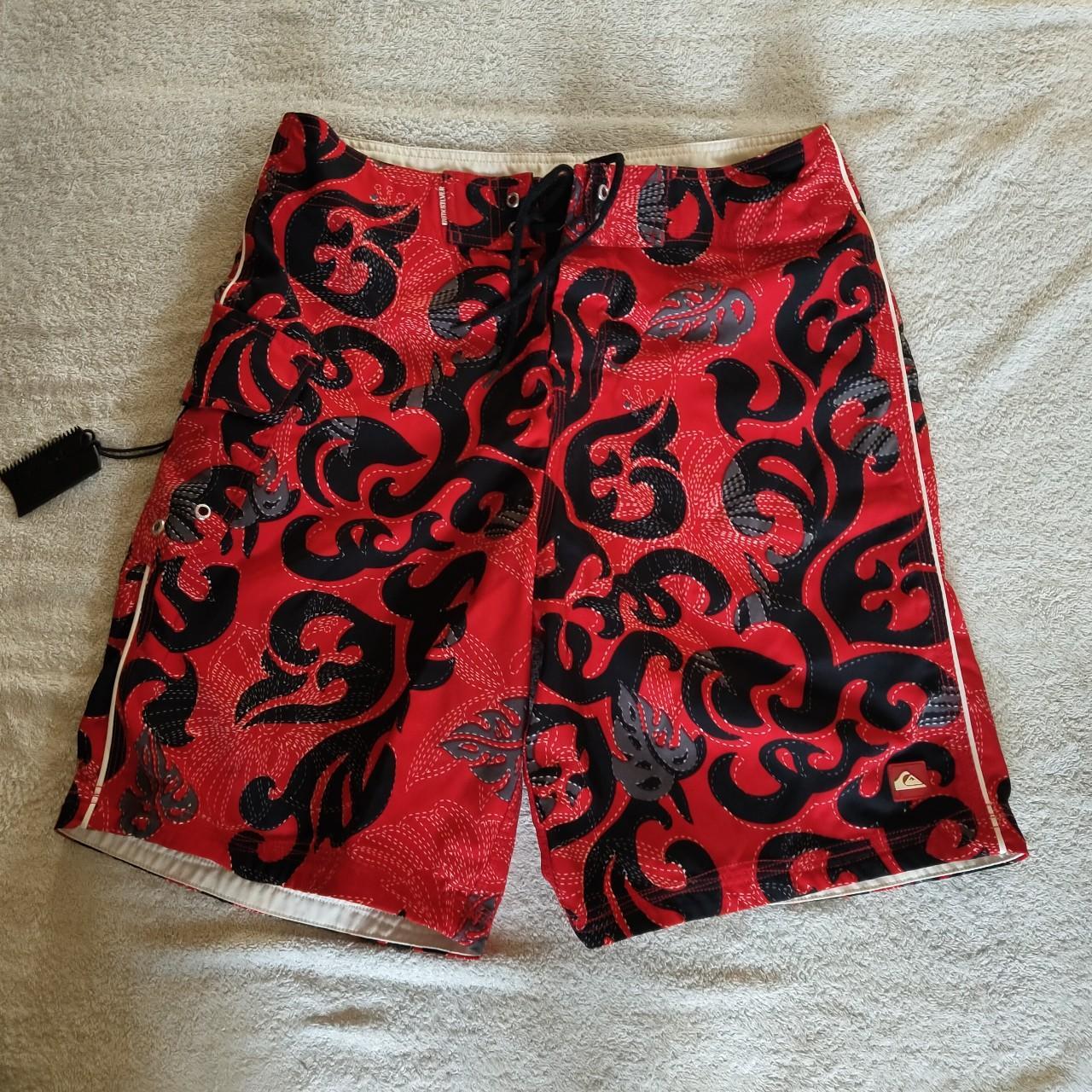 Sickest early 2000s Quicksilver board shorts. Red... - Depop