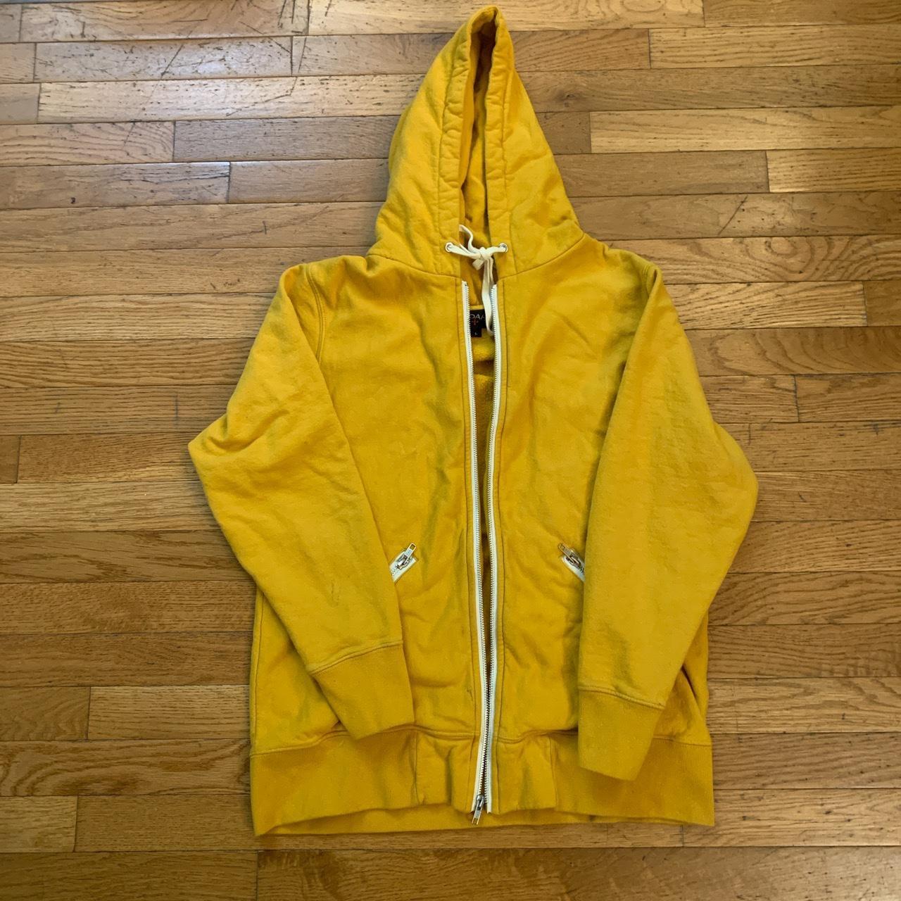 Yellow zip up hoodie nice embroidery on pocket. Size... - Depop