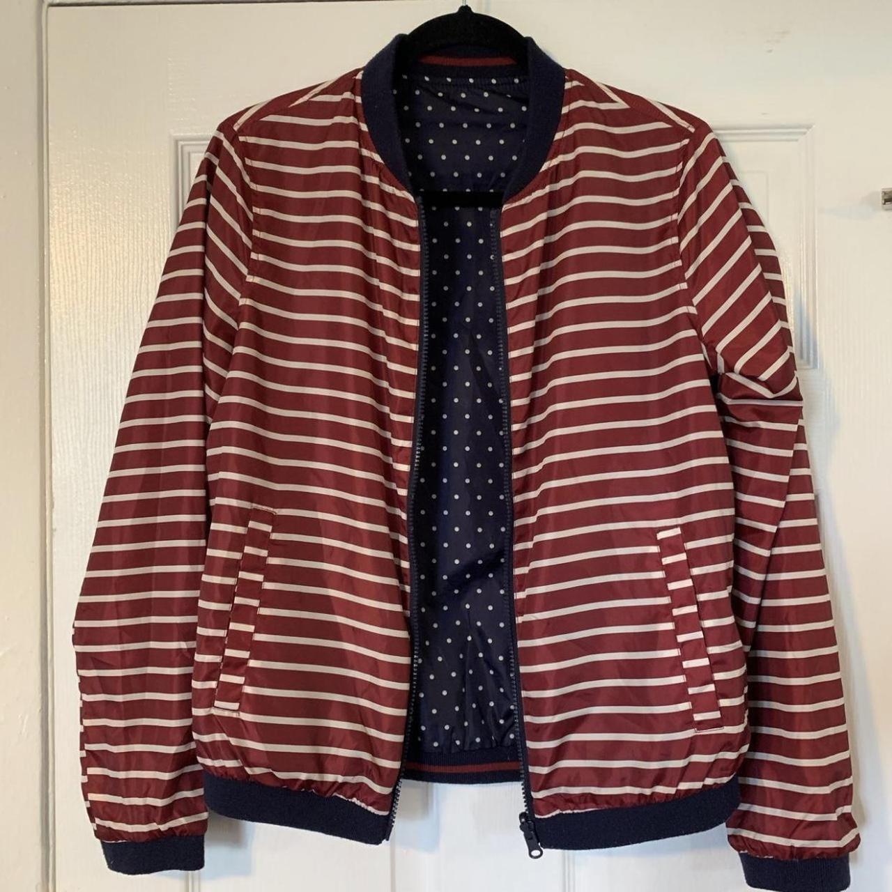 Reversible light jacket. One side is navy with... - Depop