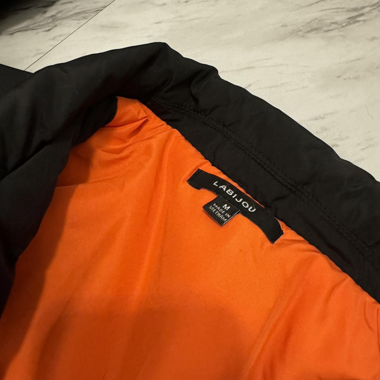 cropped black bomber jacket orange inside. size M - Depop
