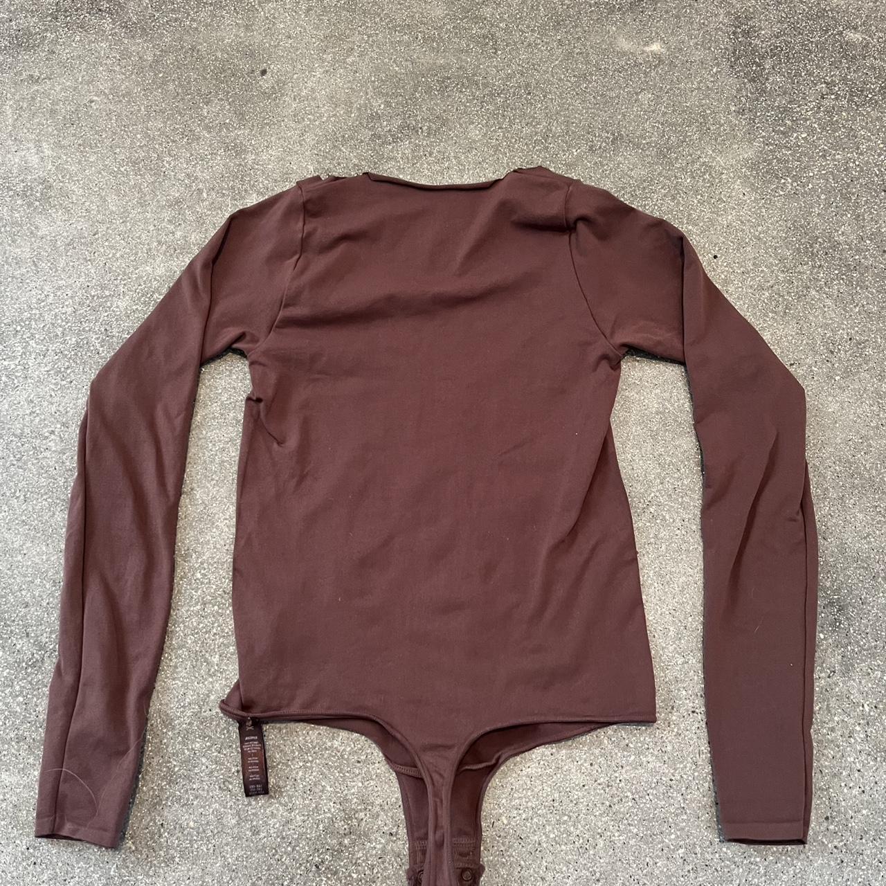Skins Brown long sleeve bodysuit cut neck Tagged... - Depop