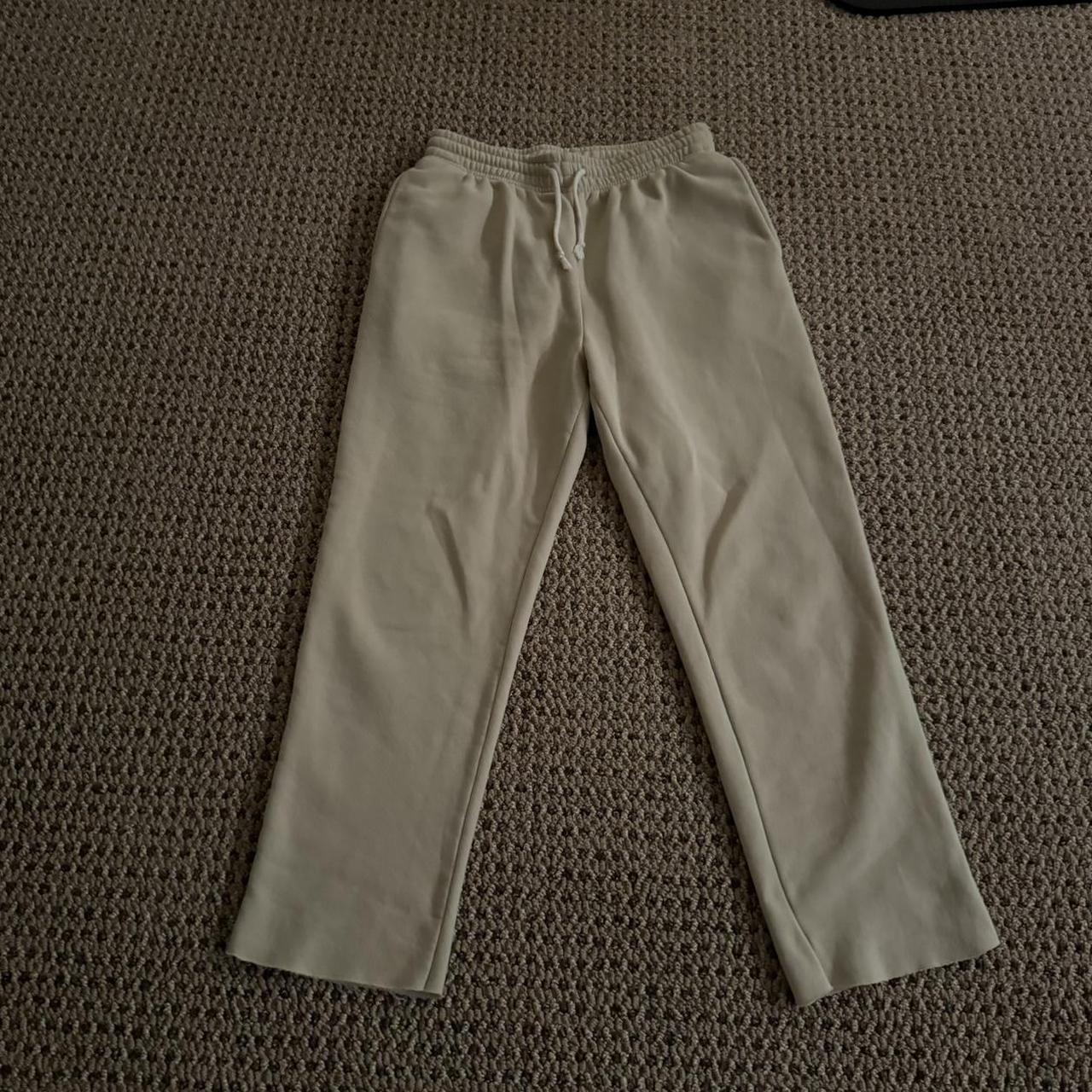 Cream/light tan sweatpants Out from under size... - Depop